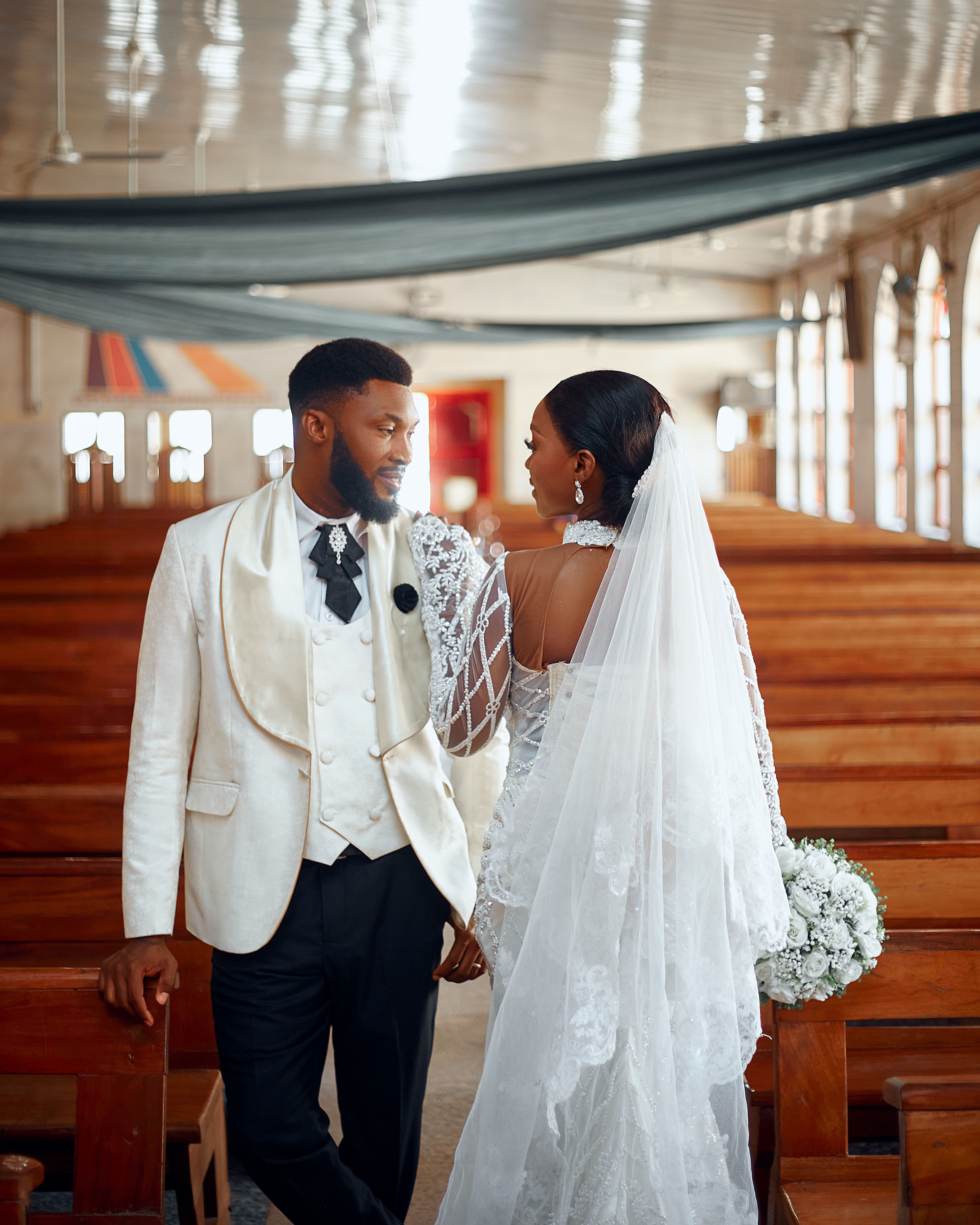 Elegant Wedding Couple in Church Ceremony · Free Stock Photo