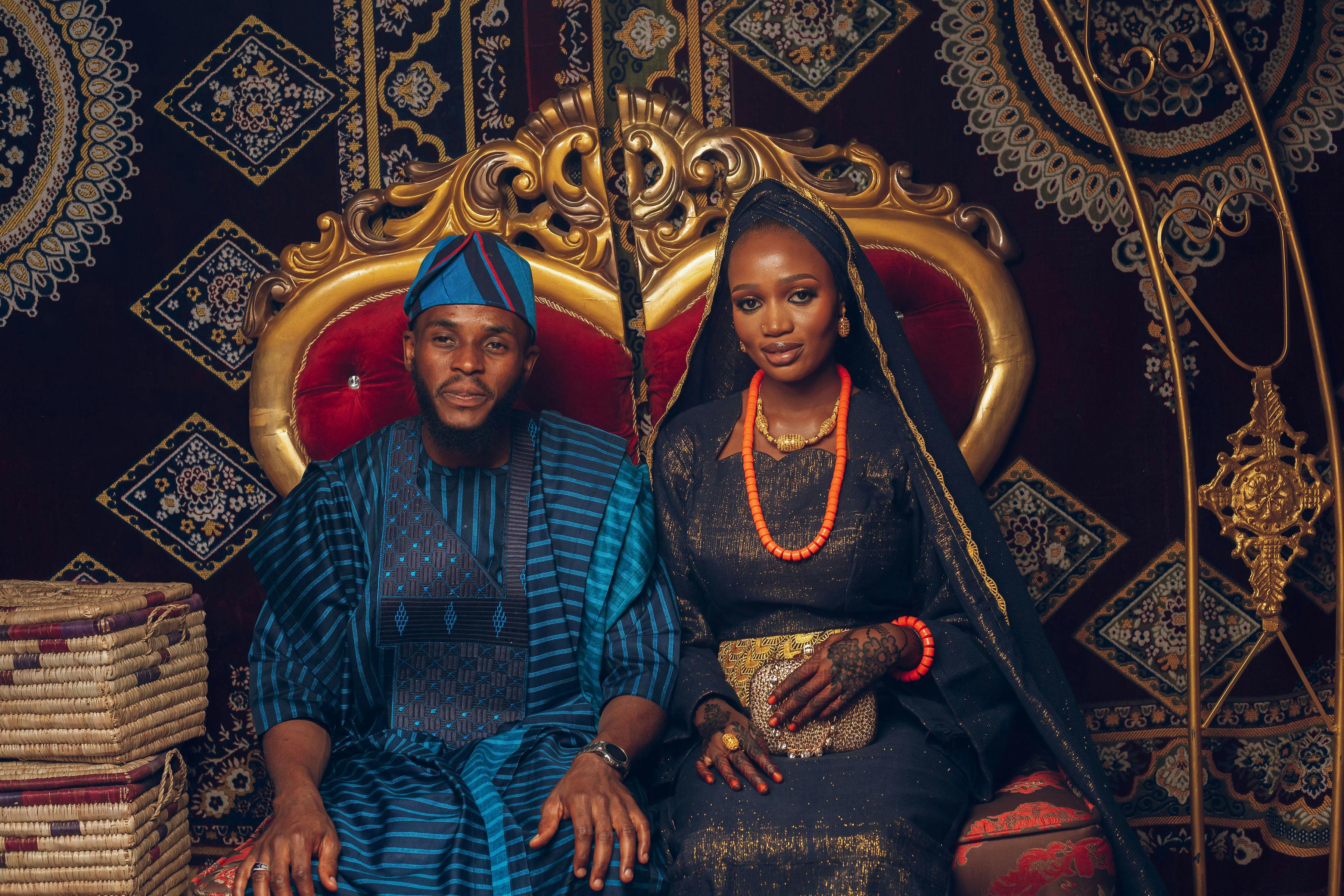Traditional Nigerian Wedding Portrait in Regal Setting · Free Stock Photo