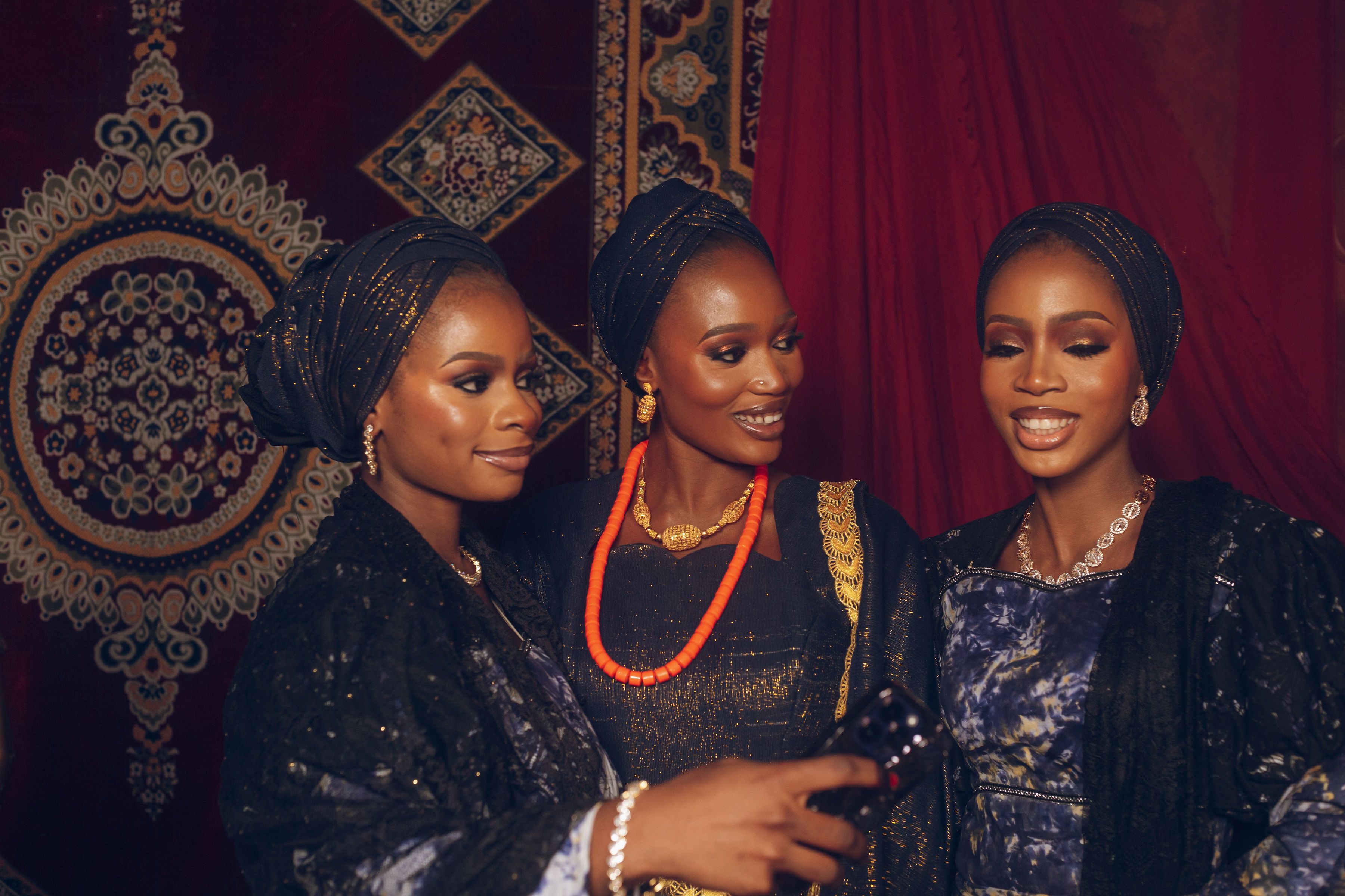 Elegant Women Celebrating in Traditional African Attire · Free Stock Photo