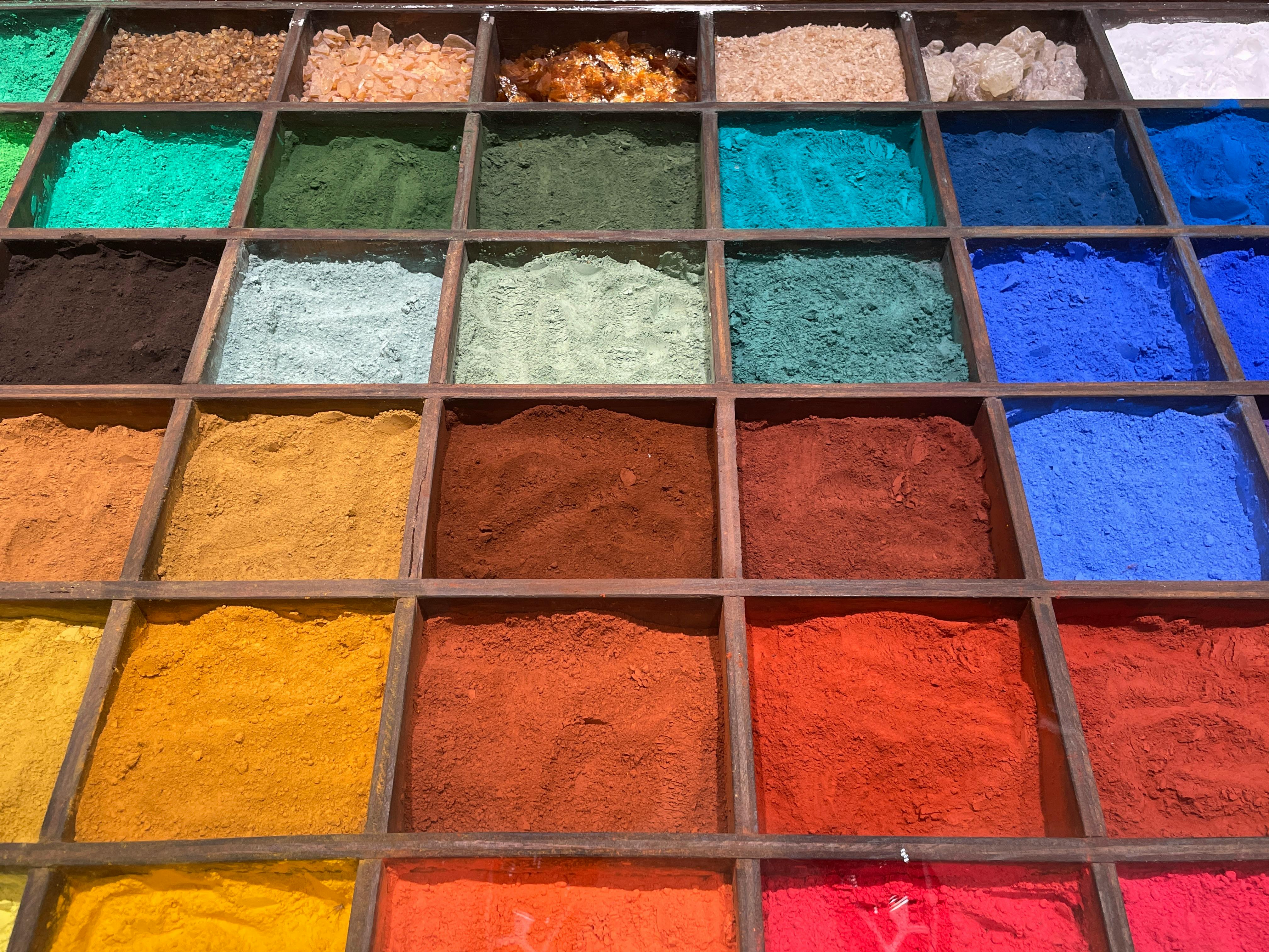 Vibrant Assorted Colored Spice Powders Display · Free Stock Photo
