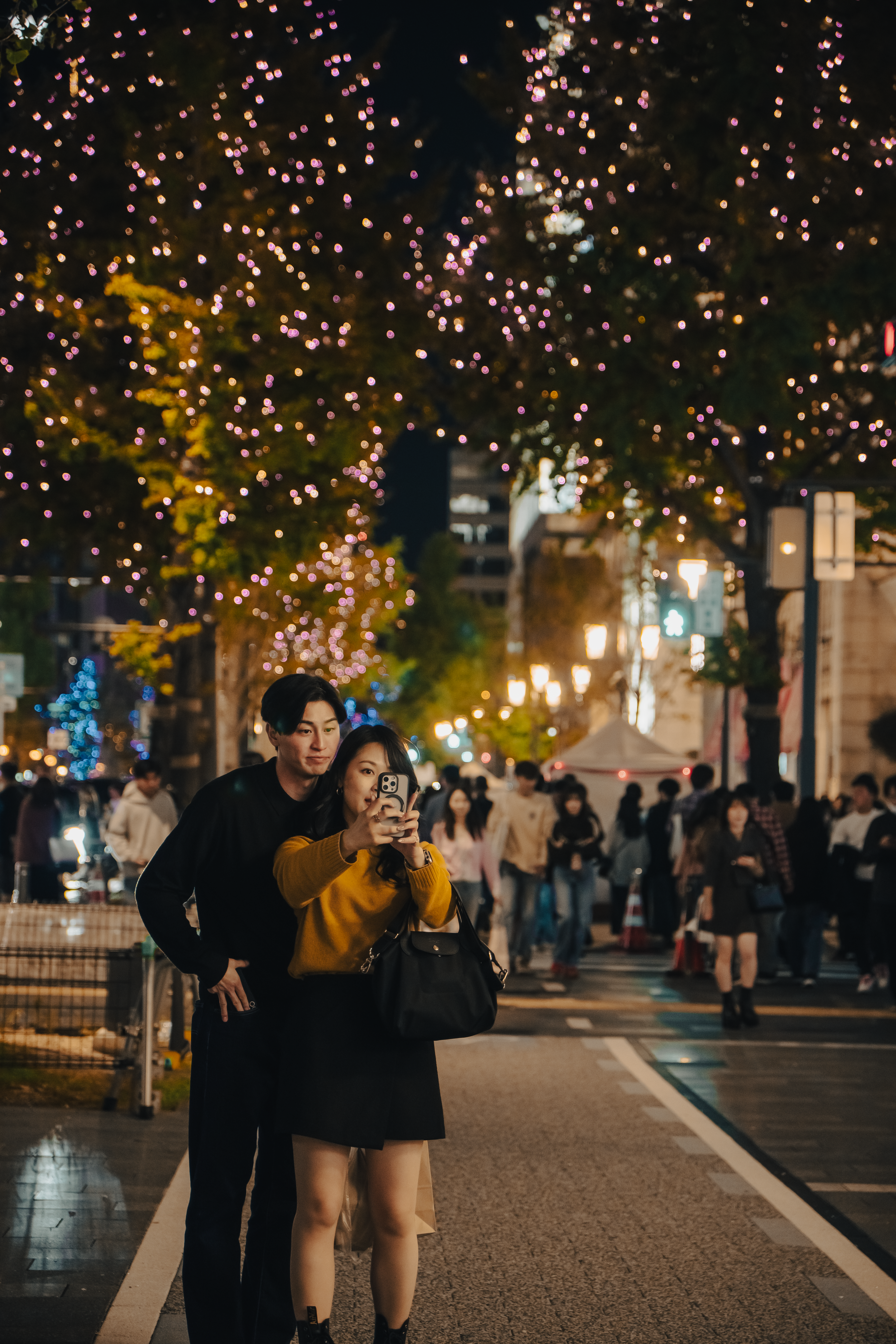 Romantic couple hugging in park at night · Free Stock Photo