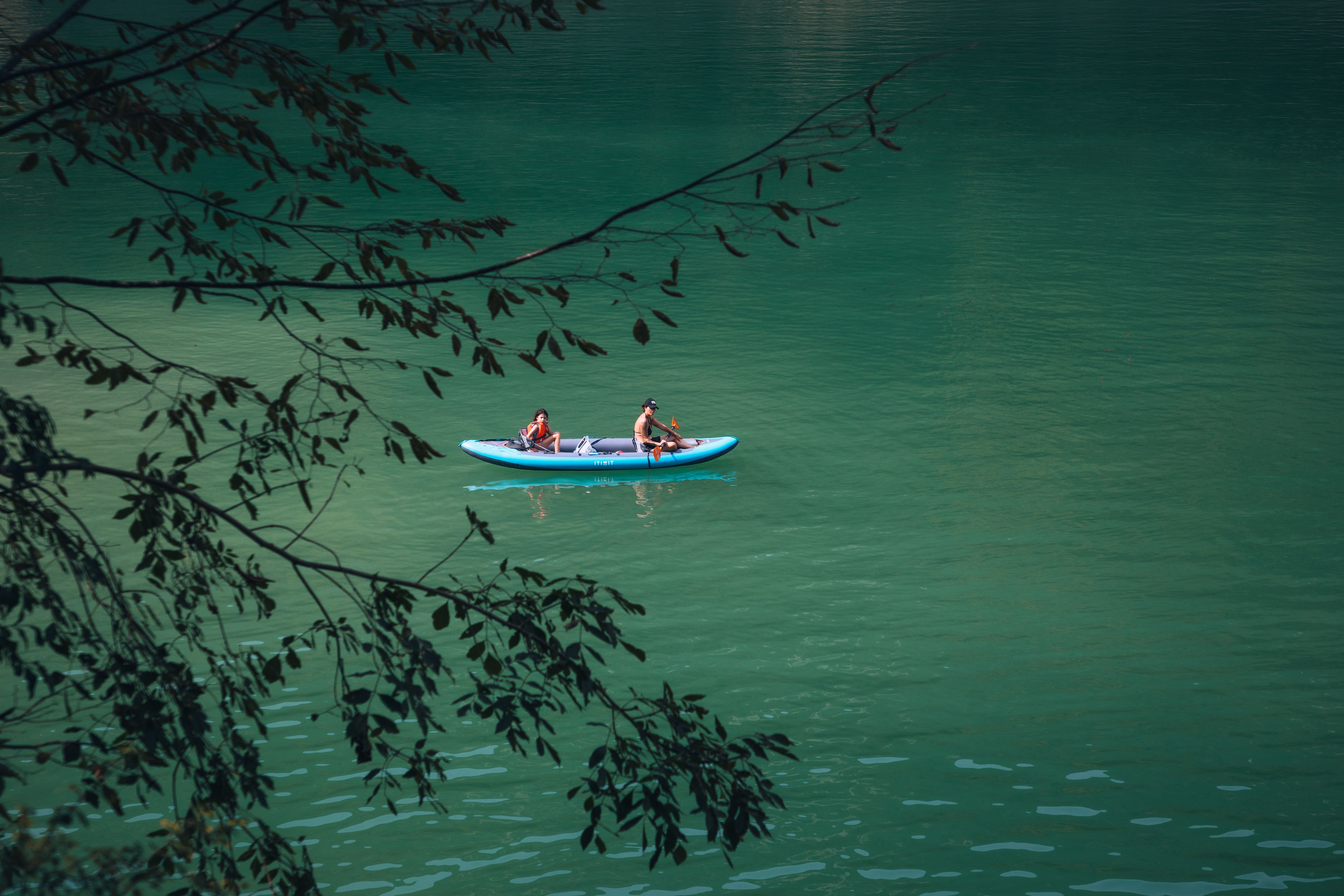 Kayaking Adventure on Tranquil Italian Lake · Free Stock Photo