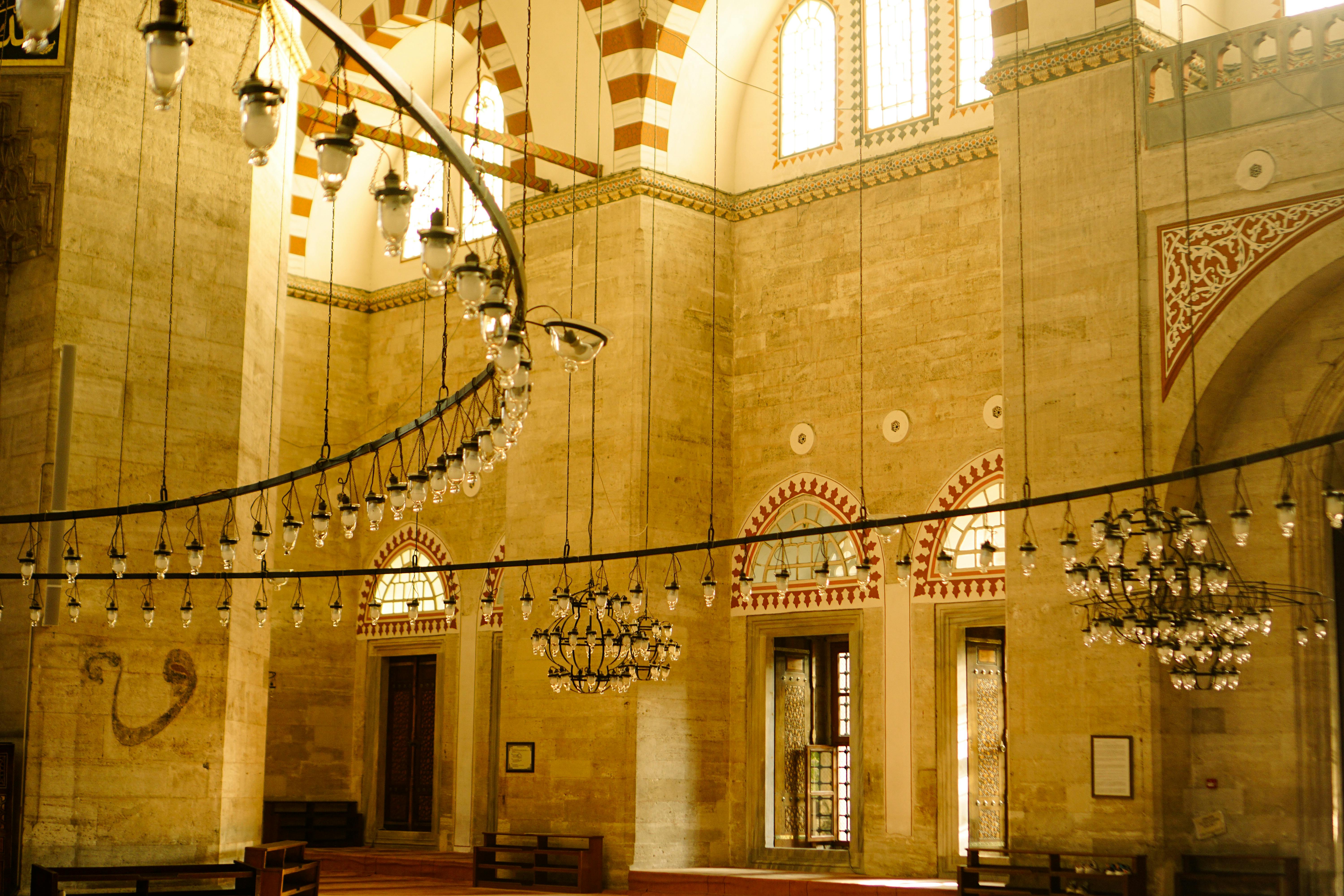 Historic Mosque Interior with Elegant Chandeliers · Free Stock Photo