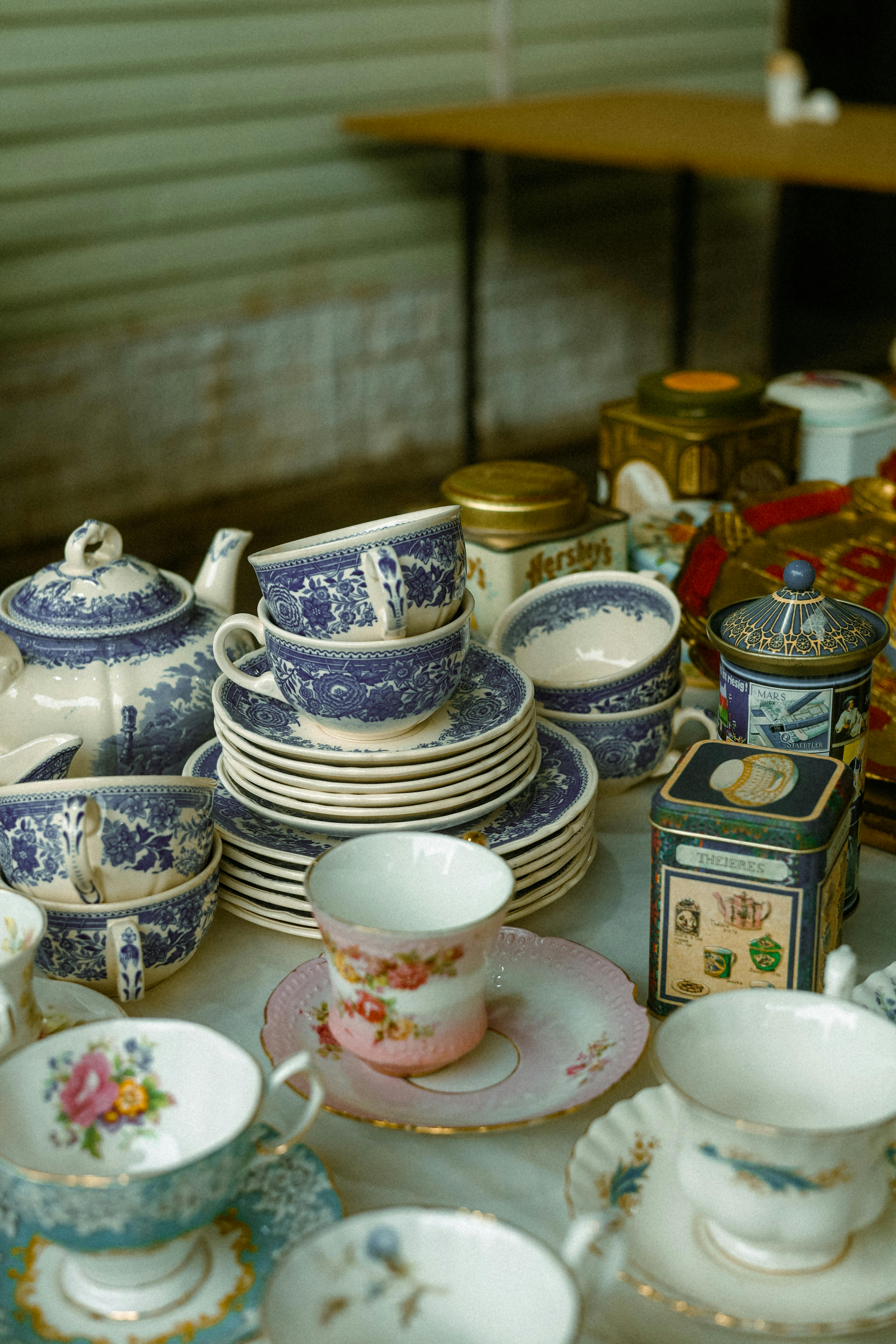 Vintage Tea Set Display at an Antique Market · Free Stock Photo