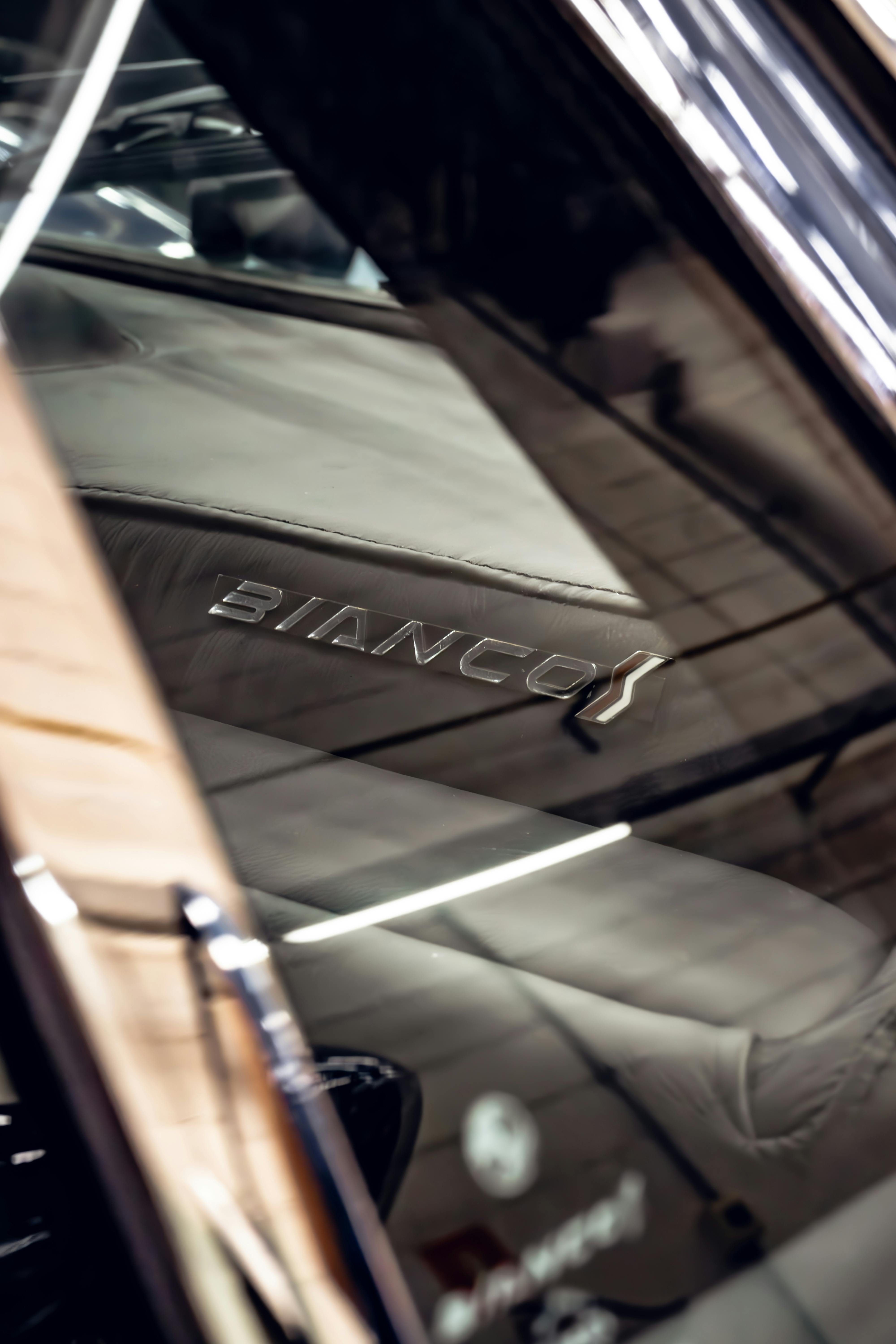 Close-up of Bianco Car Interior with Reflection · Free Stock Photo