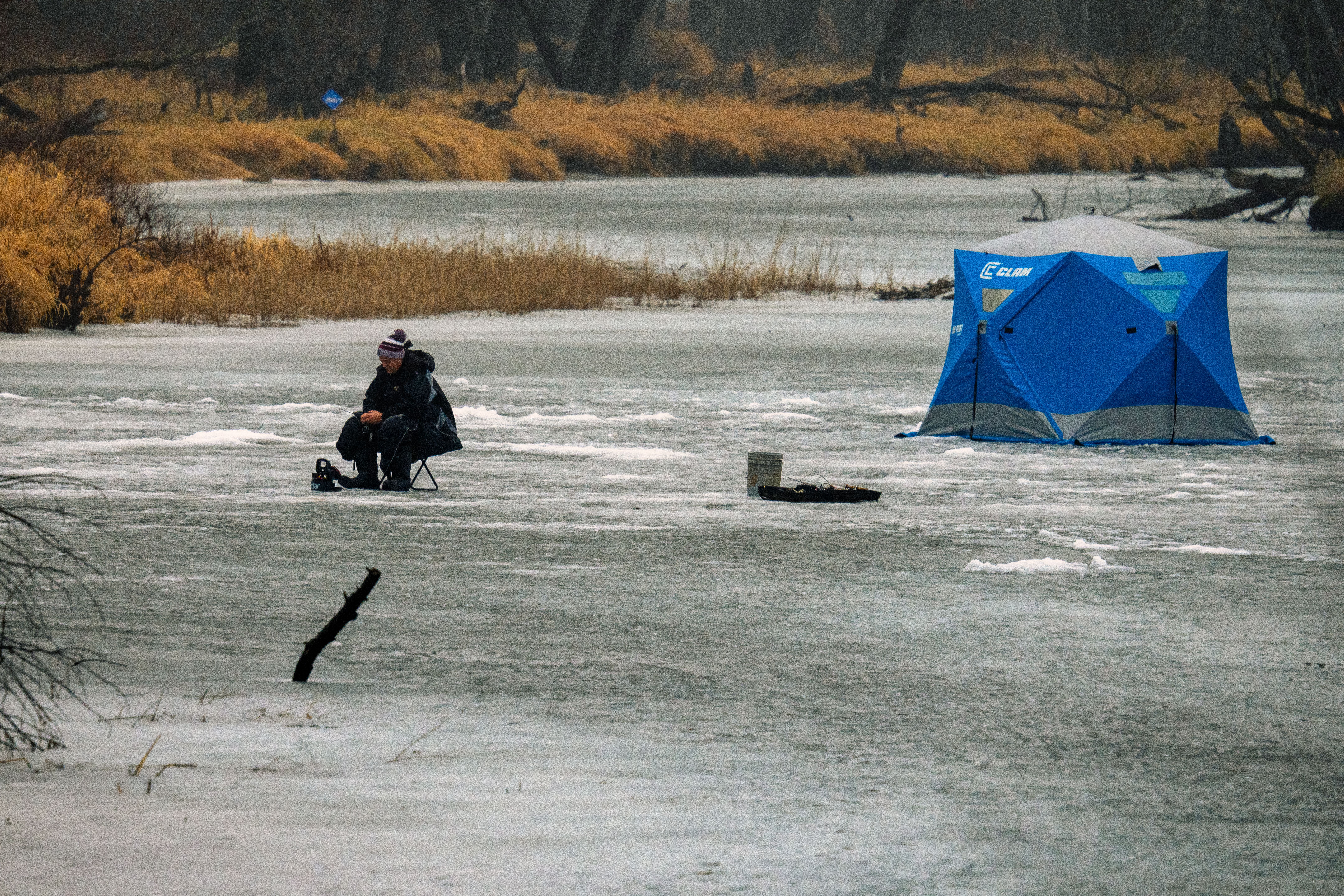 Winter Ice Fishing on a Frozen Lake · Free Stock Photo