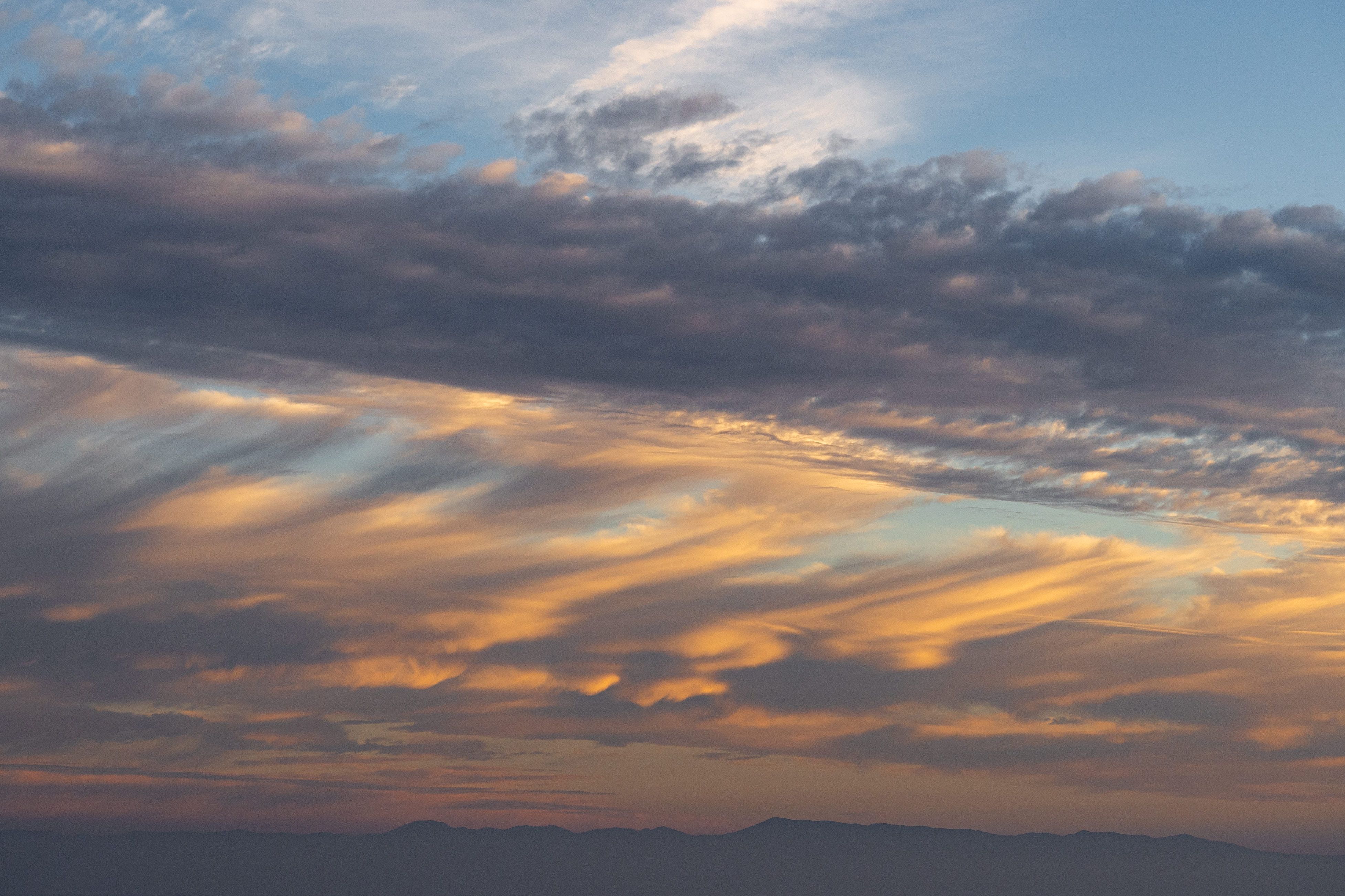 Scenic Sunset with Dramatic Cloud Formation · Free Stock Photo