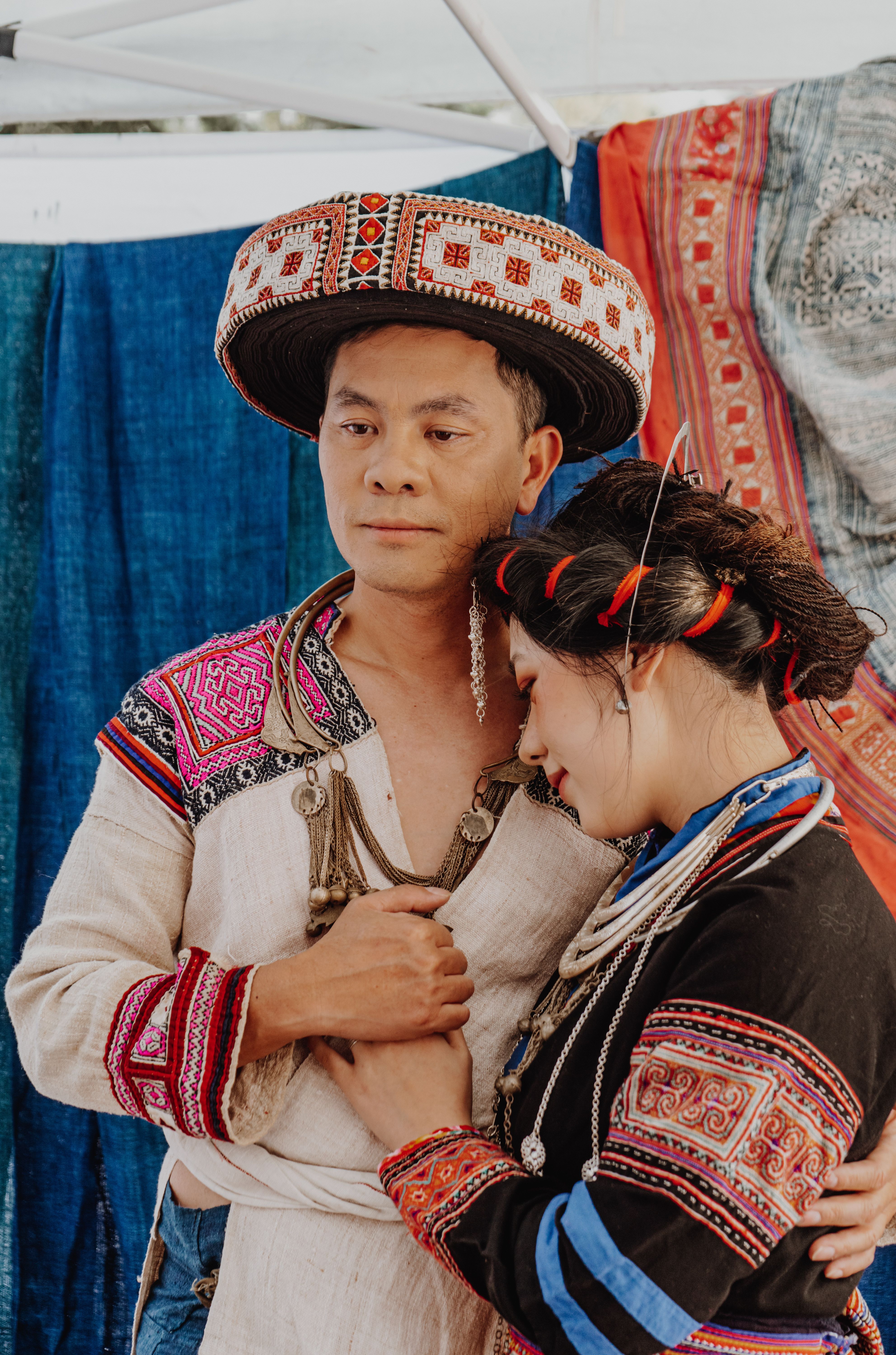 Traditional Cultural Attire Couple Embrace · Free Stock Photo