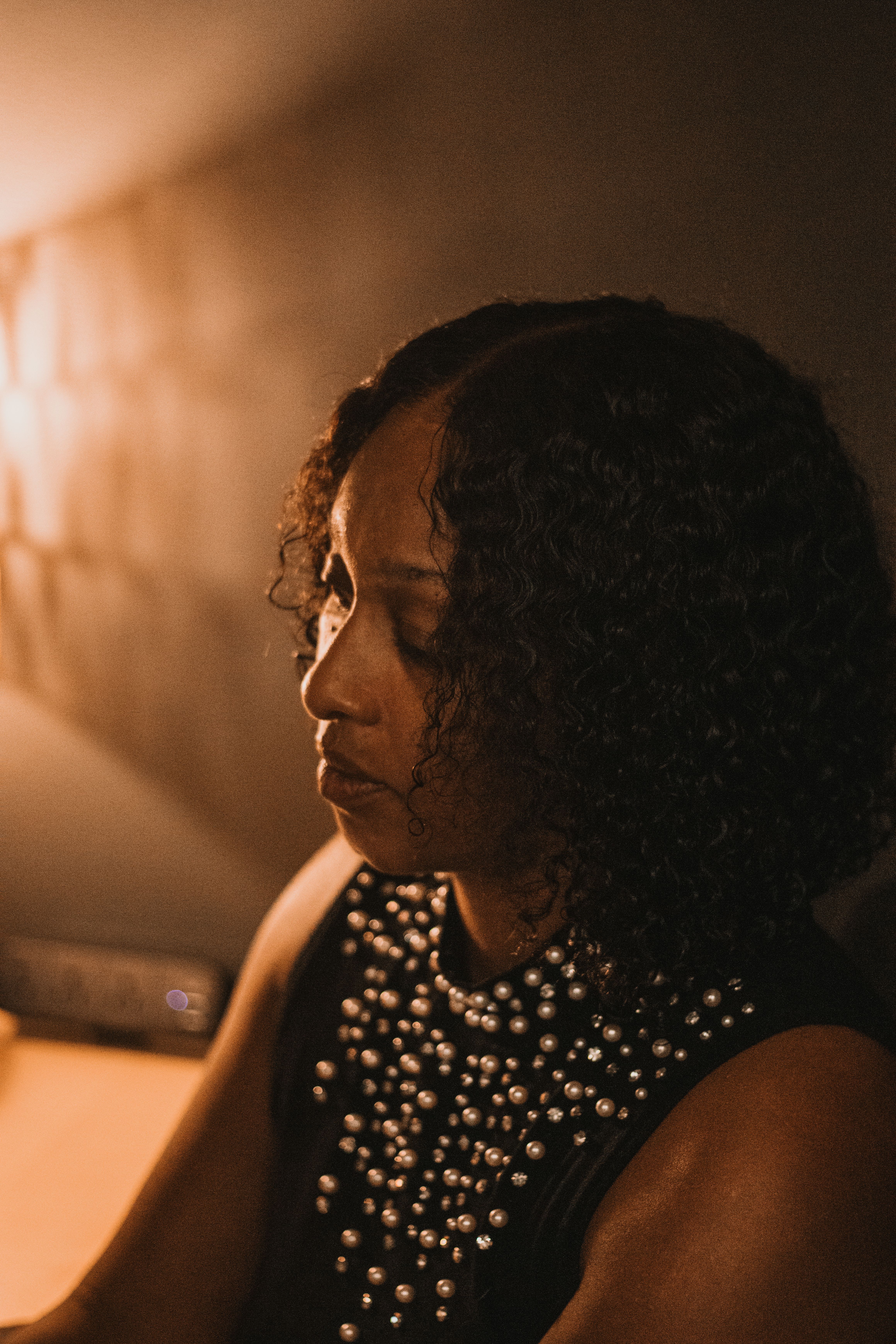 Elegant Portrait of Woman in Dim Lighting · Free Stock Photo
