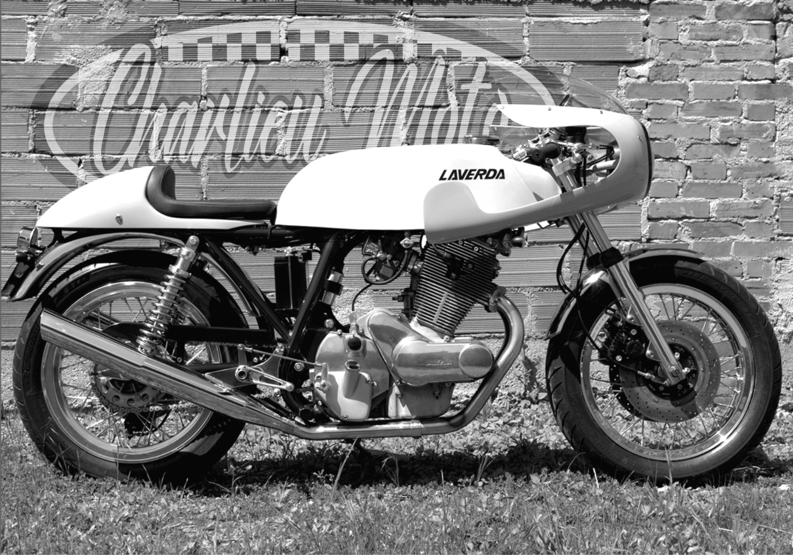Vintage Laverda Motorcycle Against Brick Wall · Free Stock Photo