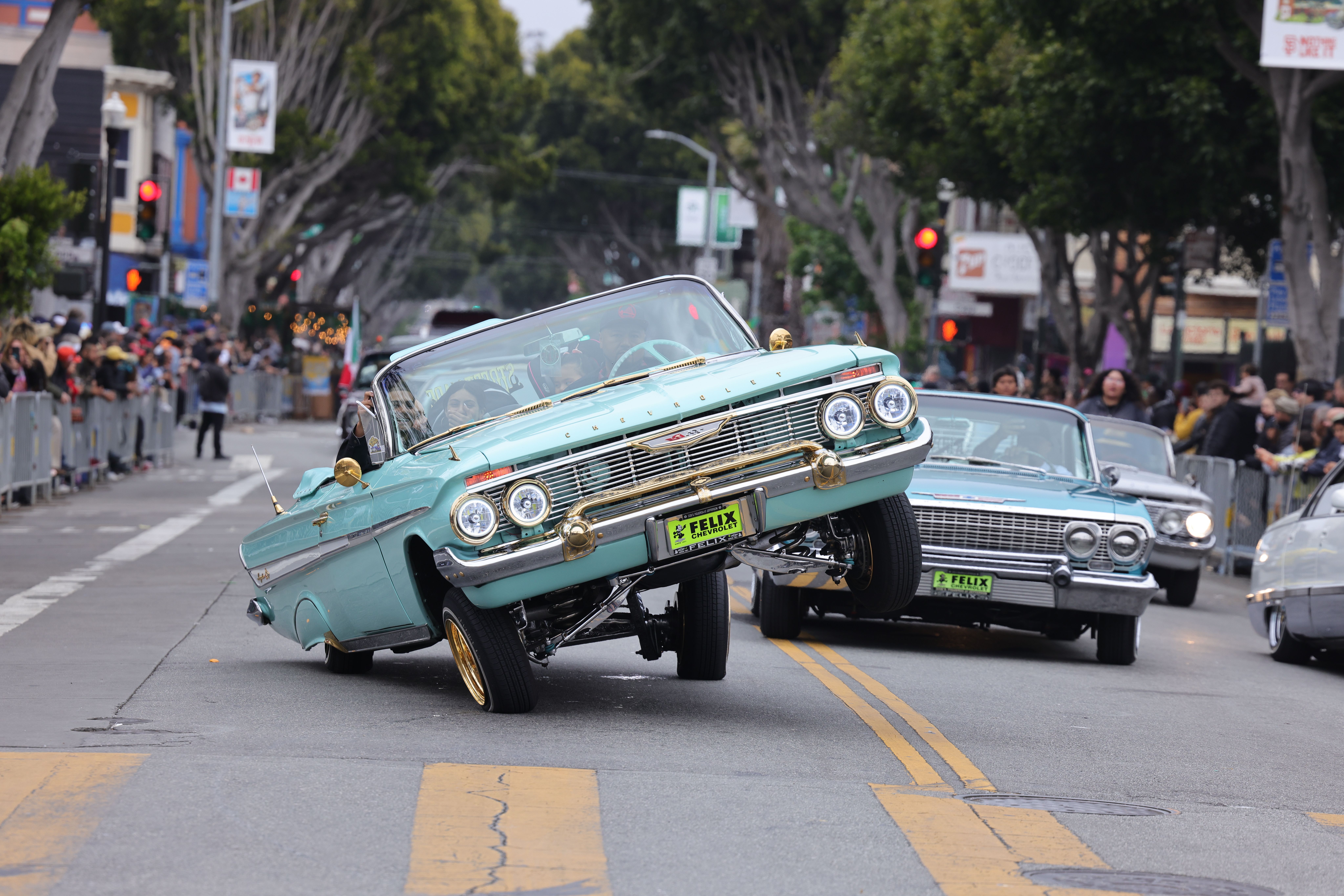 Classic Convertible Lowriding on City Street · Free Stock Photo