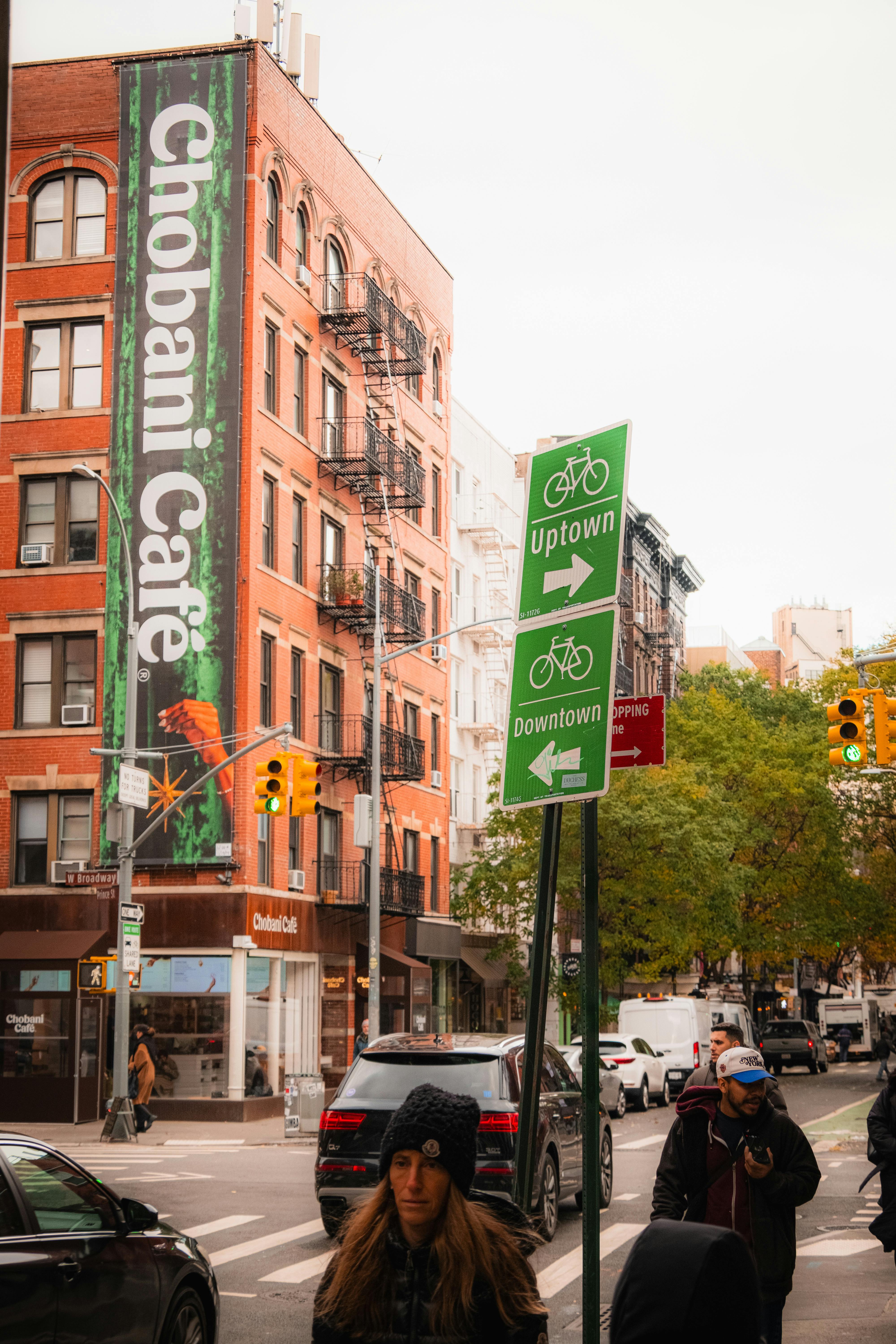 City Street Scene with Chobani Café Signage · Free Stock Photo