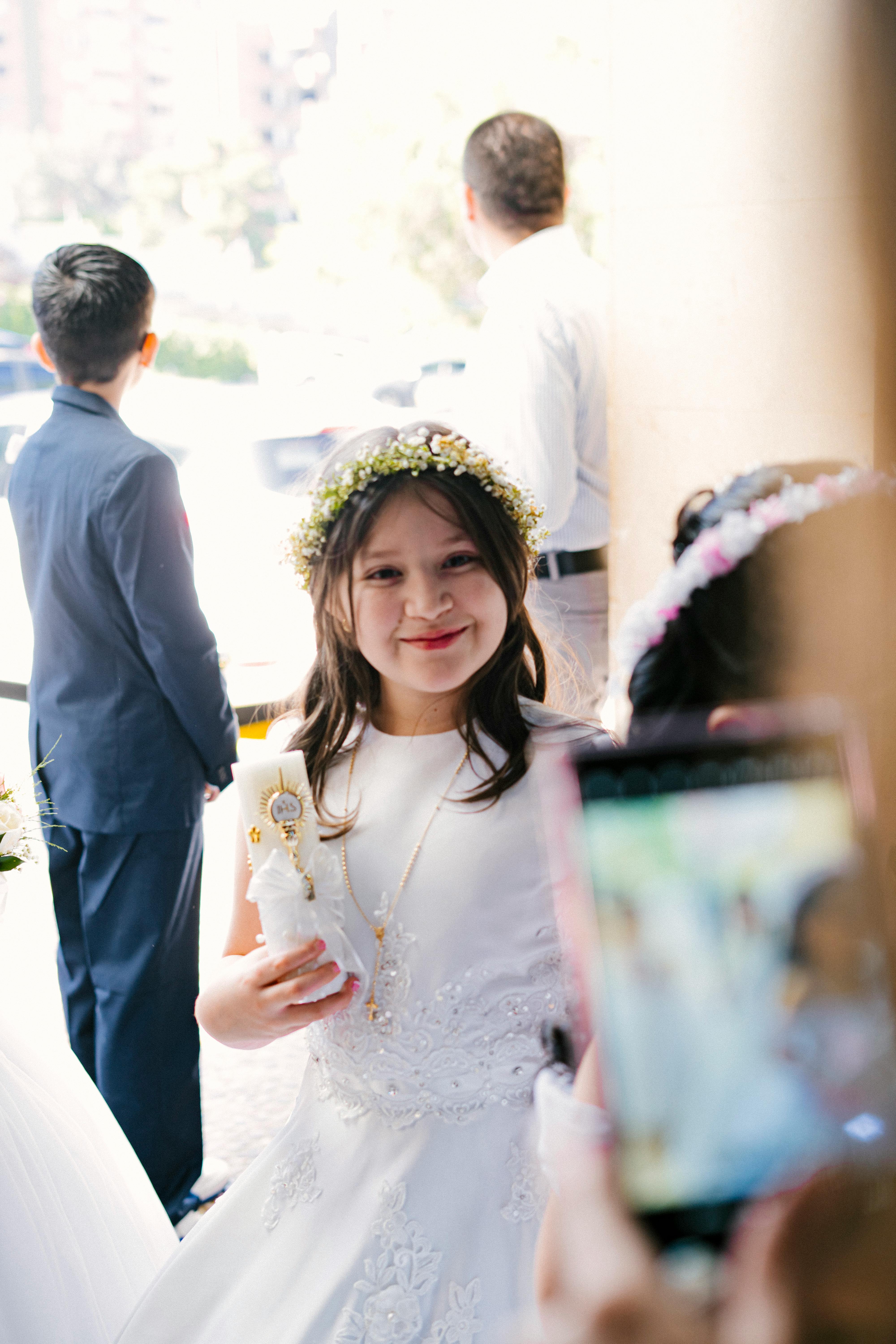 Young Girl Celebrating First Communion Ceremony · Free Stock Photo