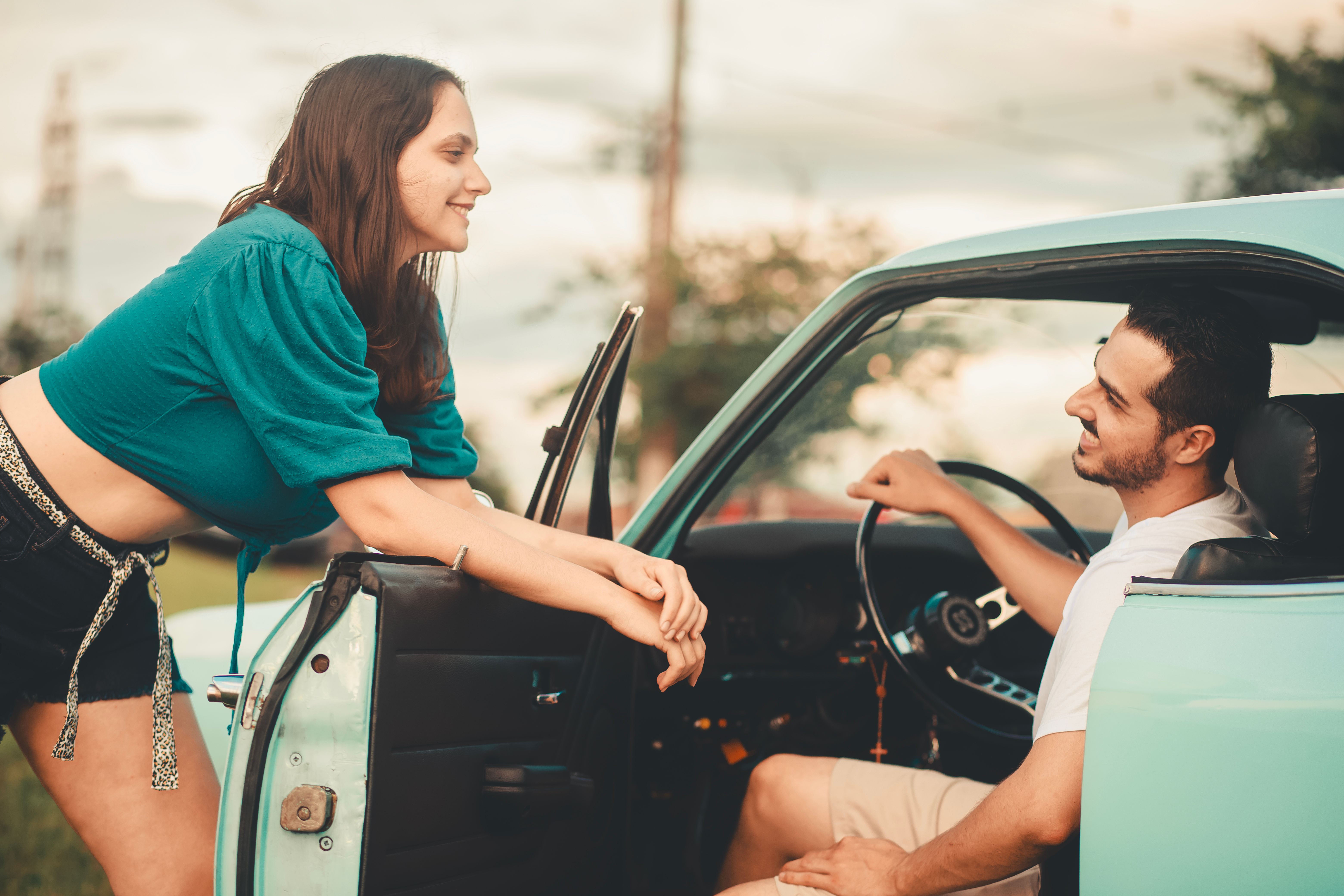 Young Couple Enjoying a Summer Drive · Free Stock Photo