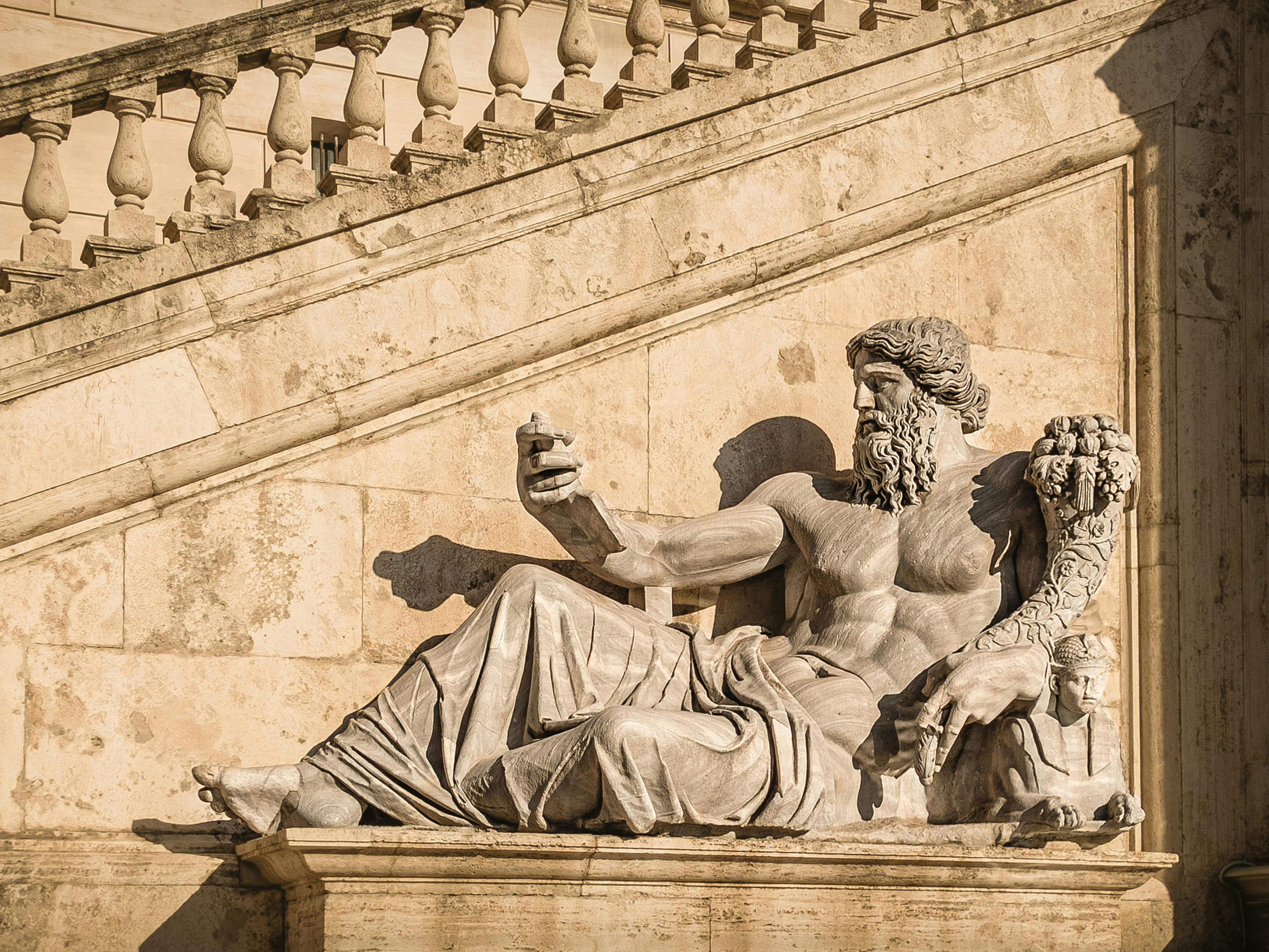 Classic Roman Statue in Architectural Setting · Free Stock Photo