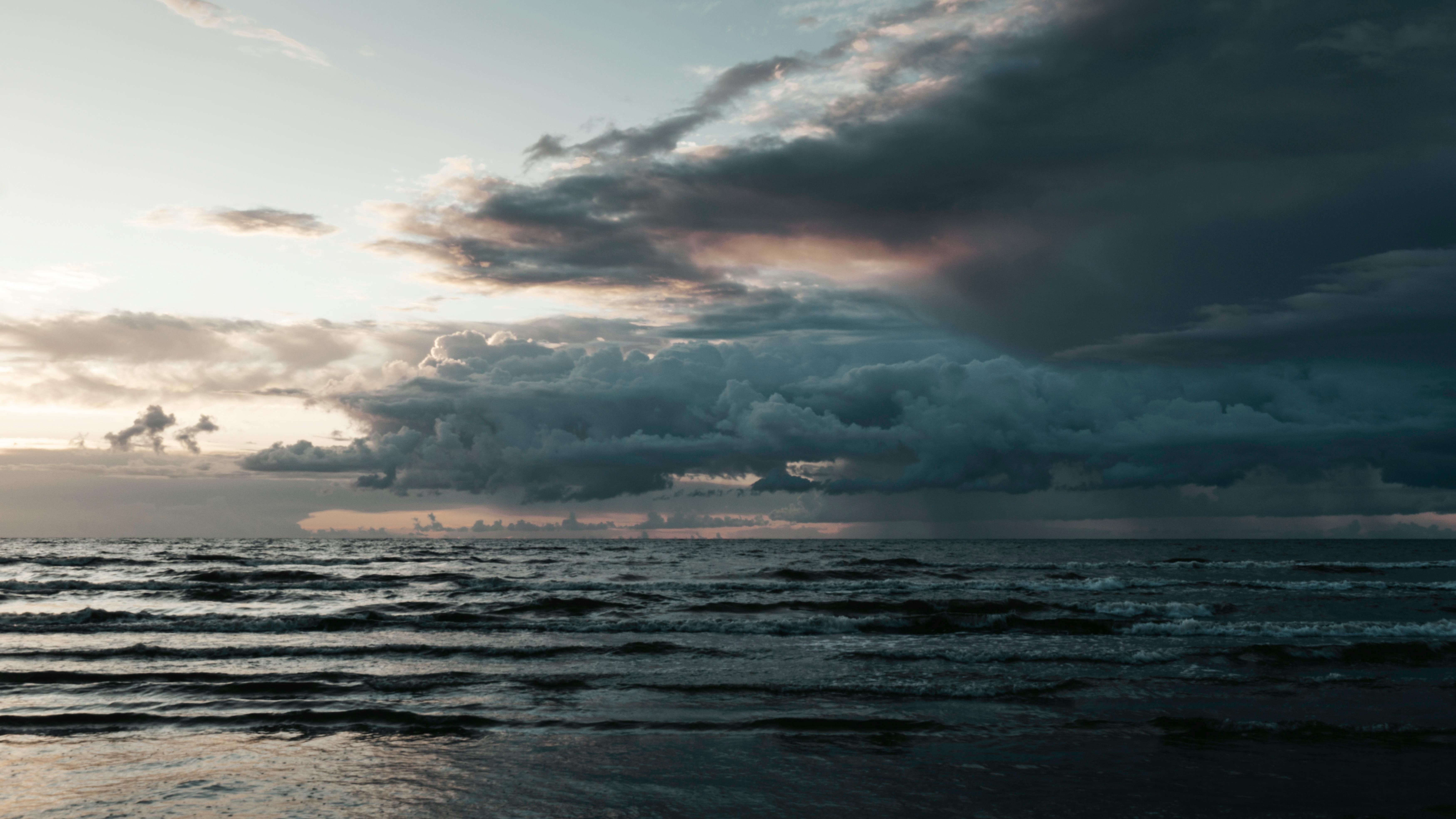 Dramatic Cloudy Seascape at Sunset · Free Stock Photo