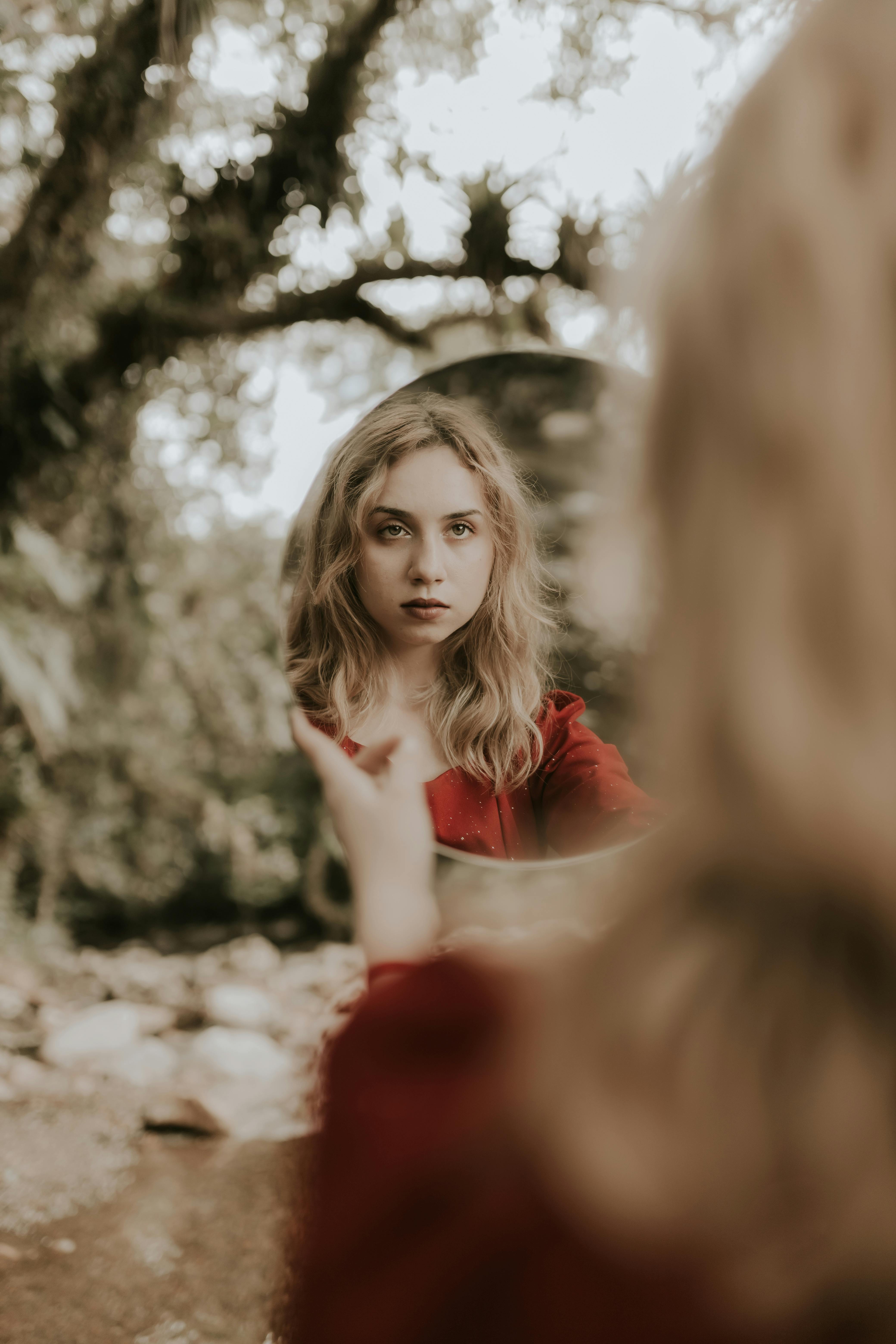 Reflective Portrait in Nature Setting · Free Stock Photo