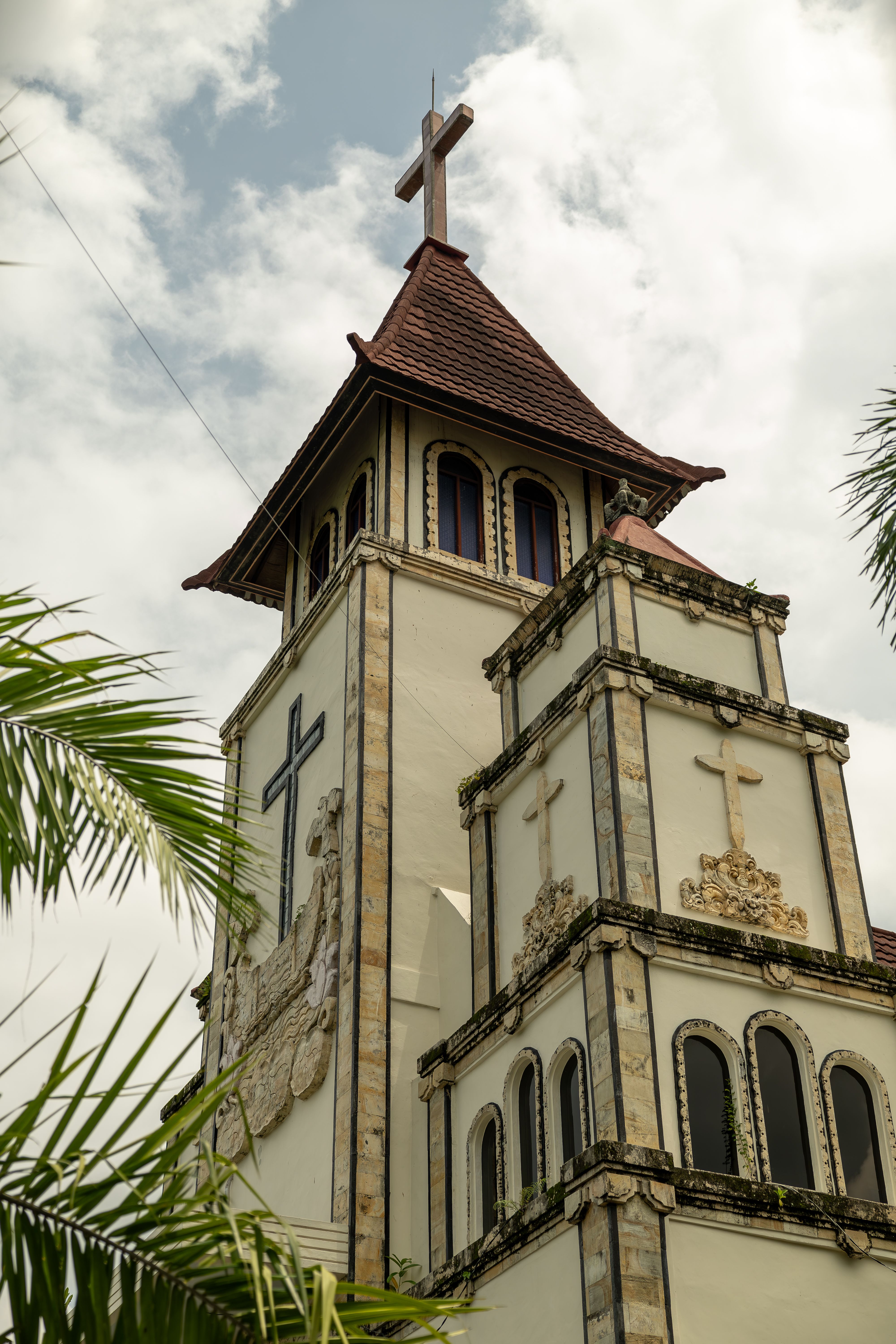 Gothic Revival Church Tower against Cloudy Sky · Free Stock Photo