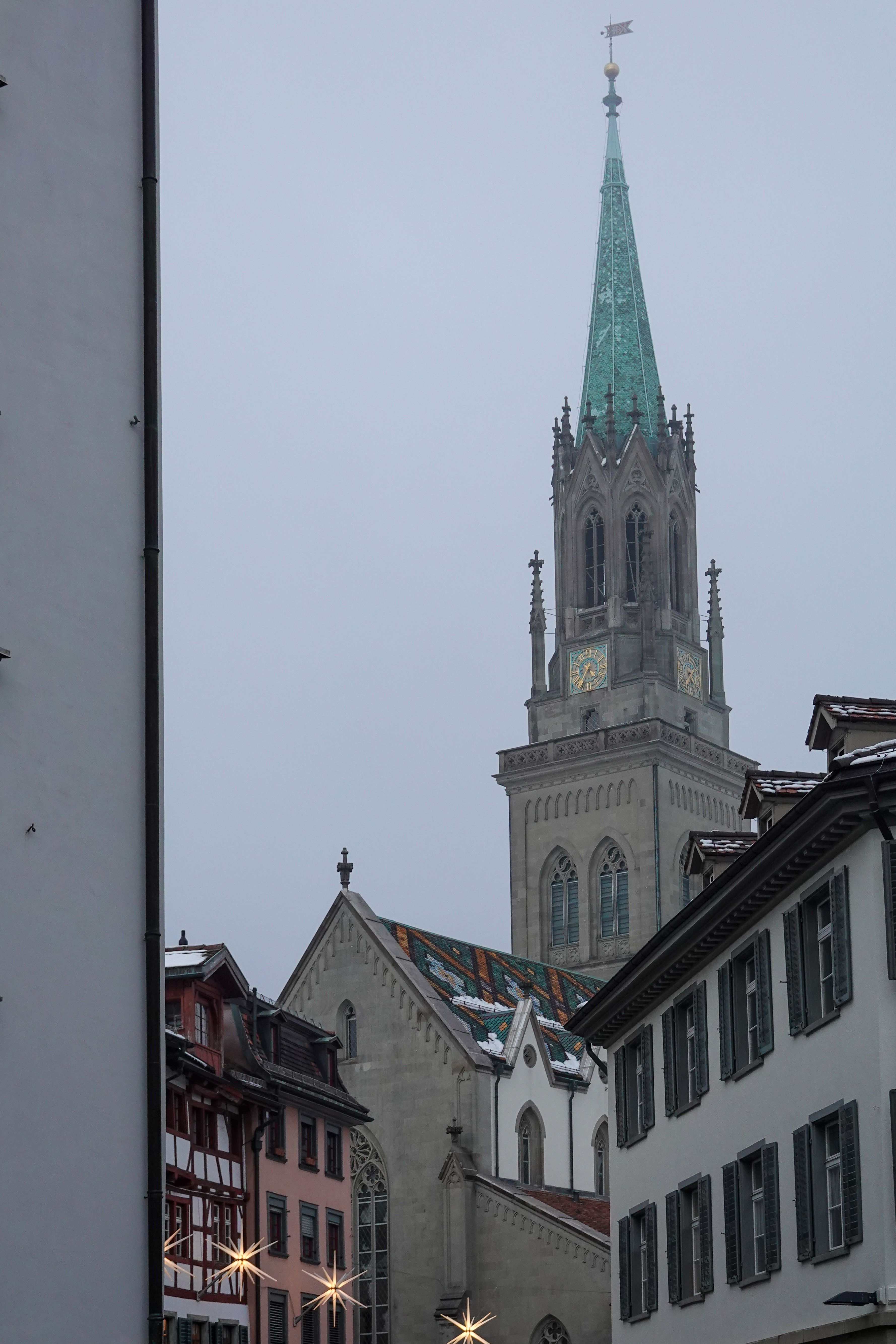 Historic Church Tower in Wintertime Swiss Cityscape · Free Stock Photo