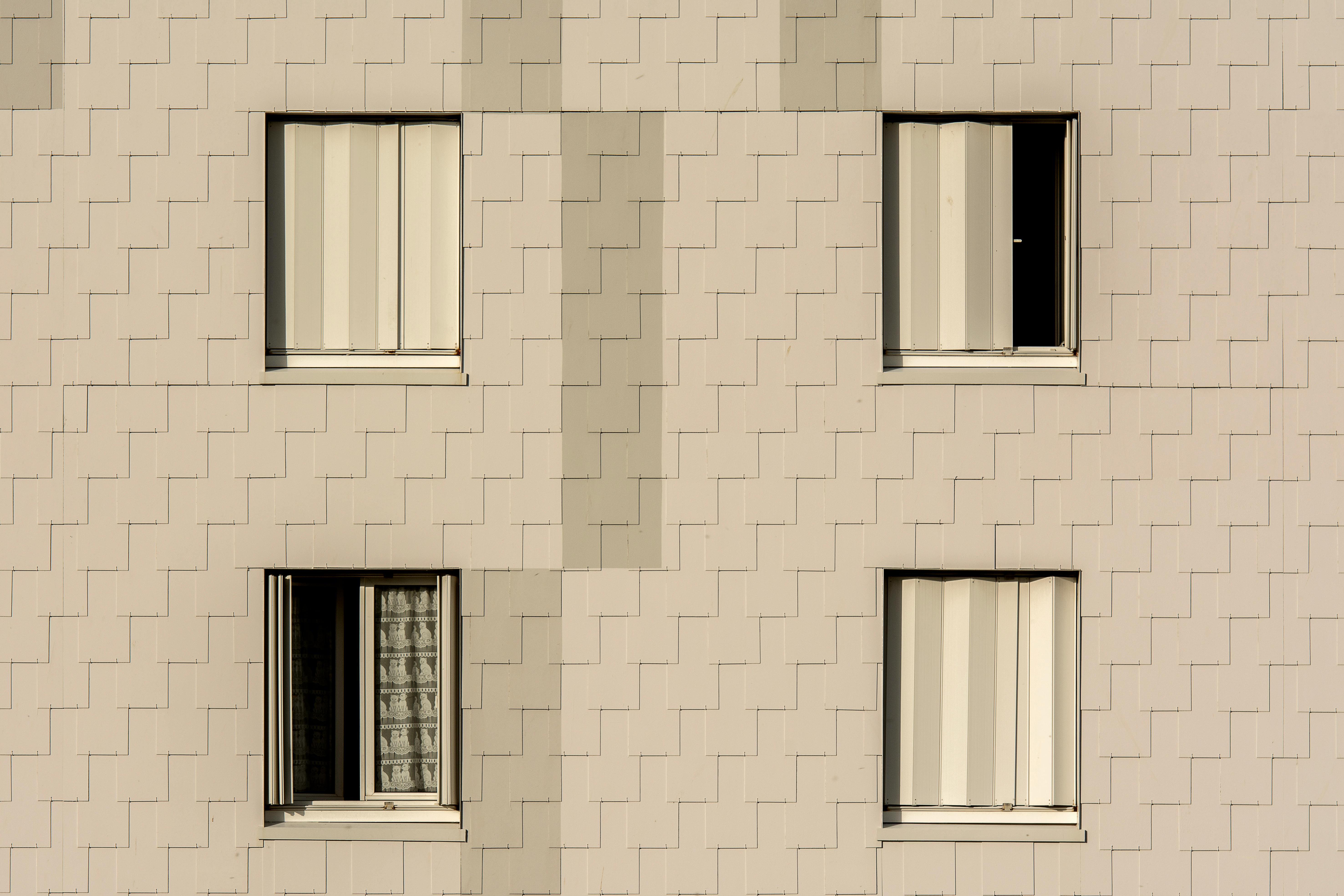 Modern Apartment Building Facade with Windows · Free Stock Photo