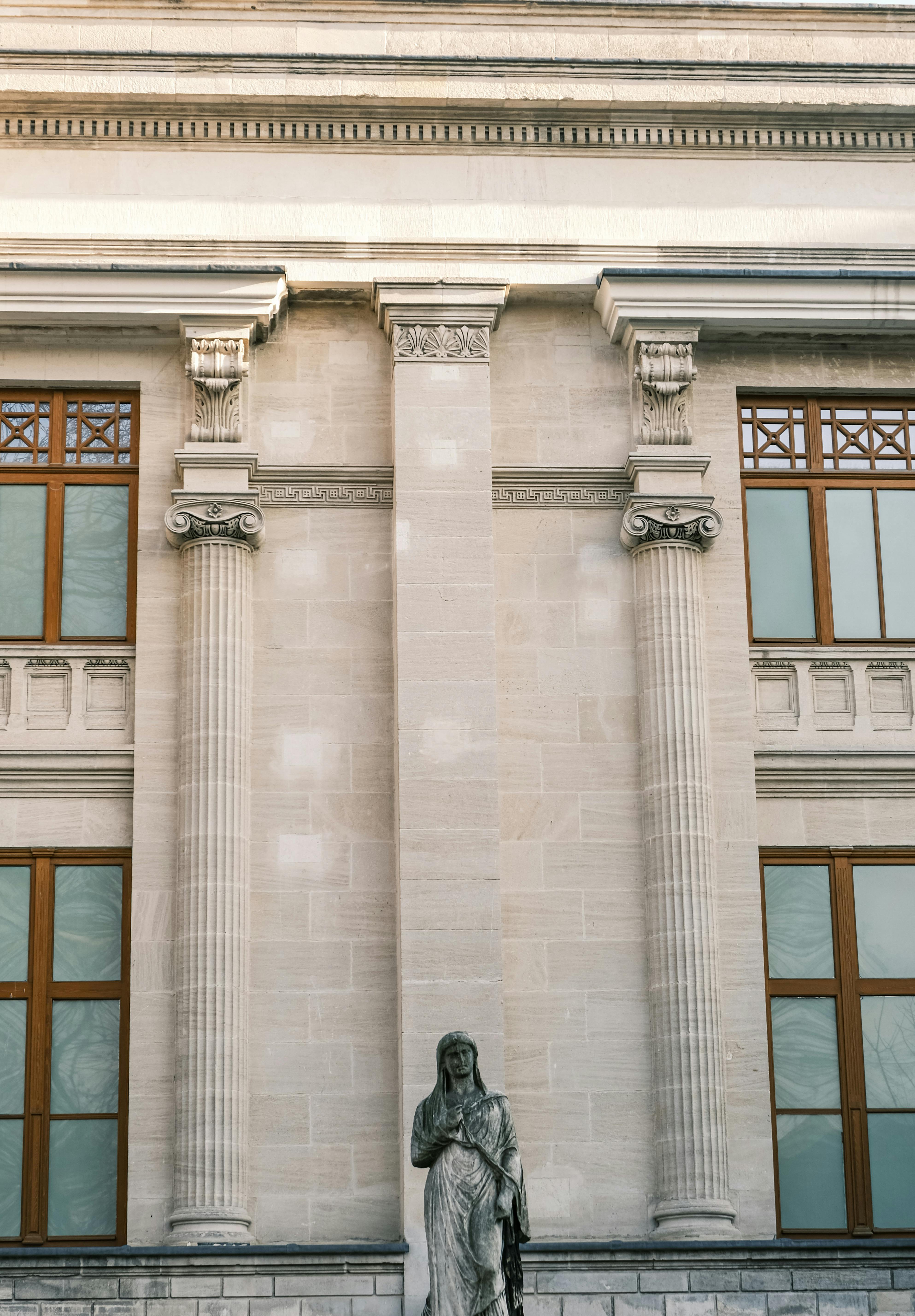 Classical Architecture with Statue in Museum Setting · Free Stock Photo