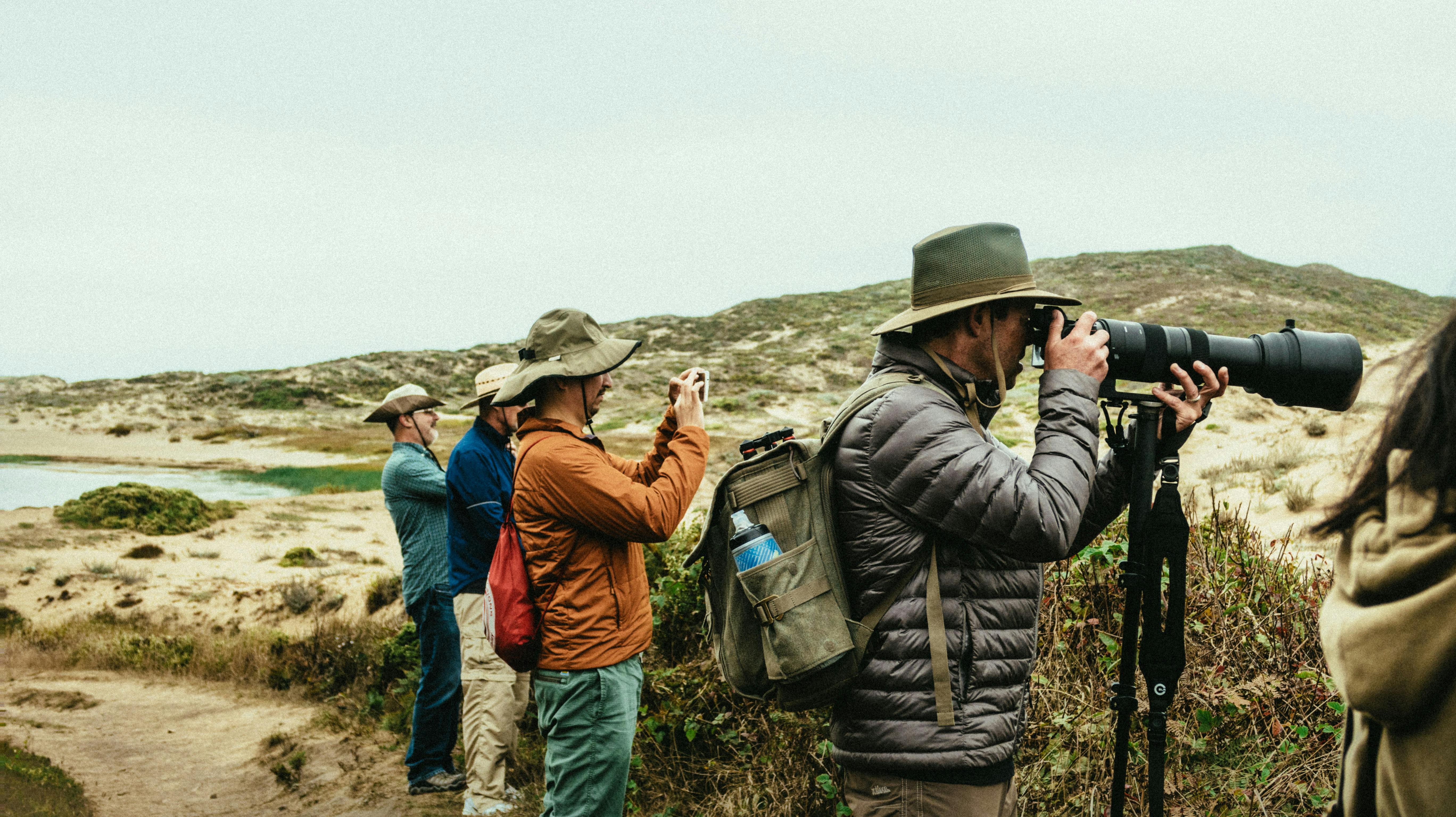 Men Using Camera · Free Stock Photo