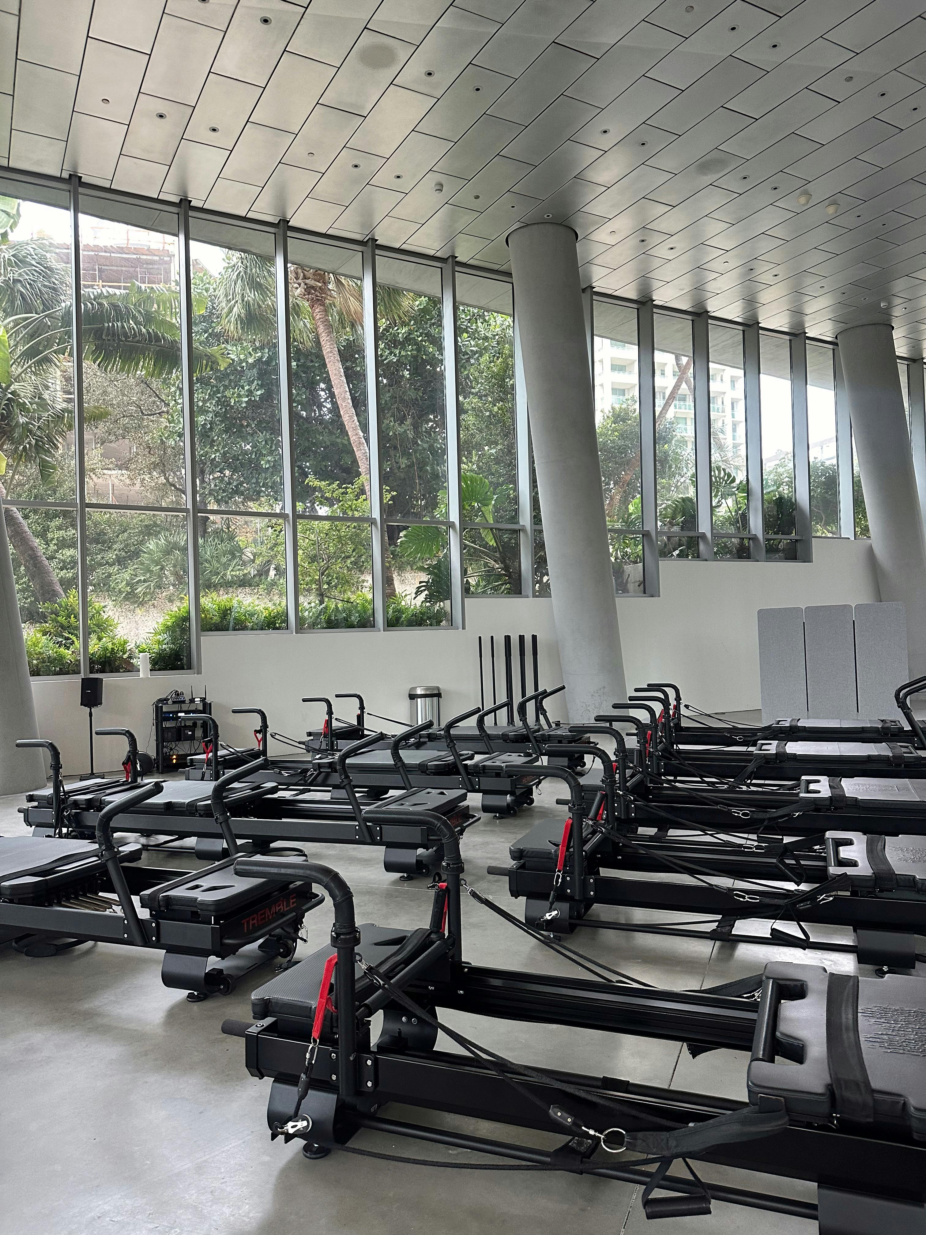 Modern Gym Interior with Rowing Machines · Free Stock Photo