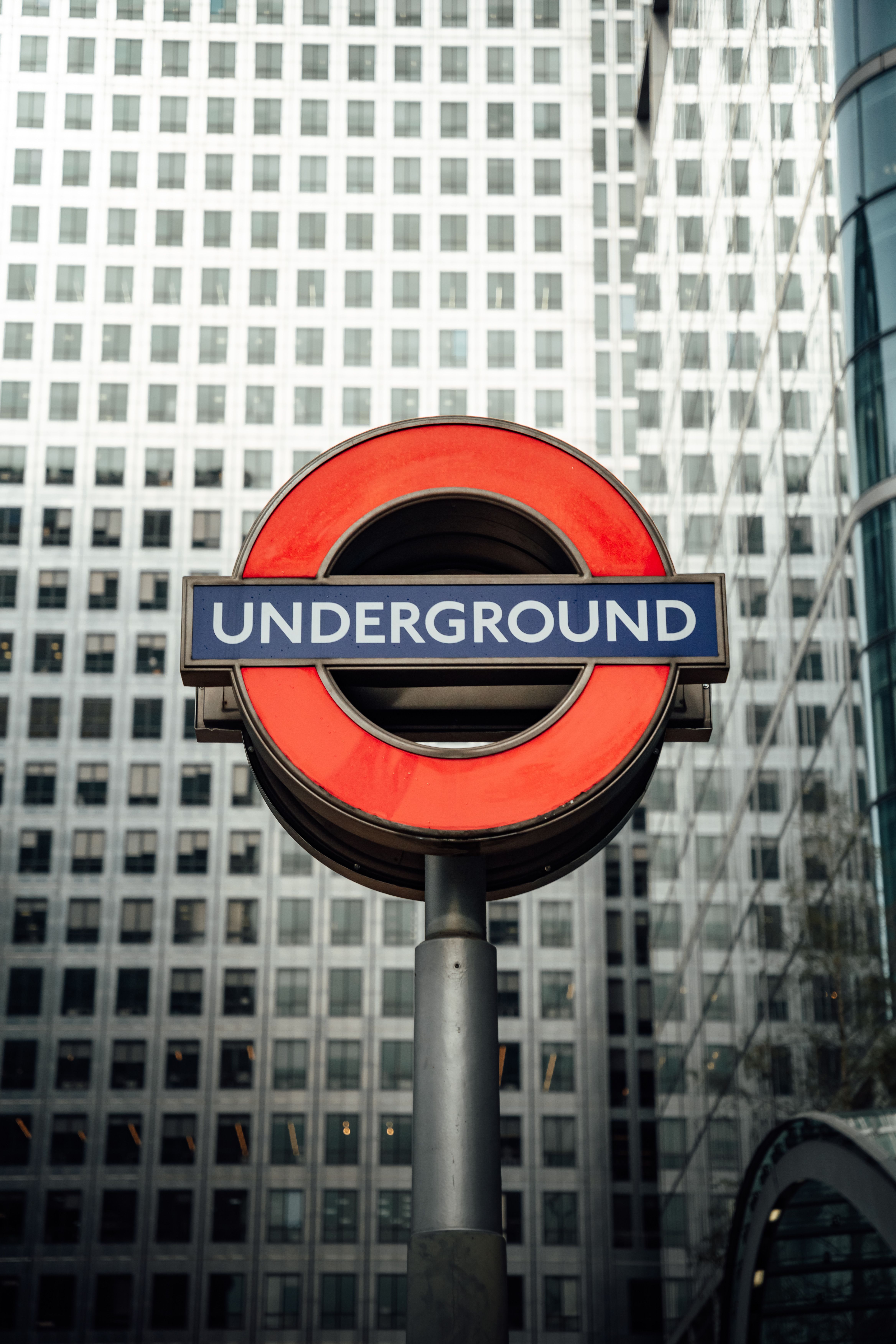 Iconic London Underground Sign at Canary Wharf · Free Stock Photo