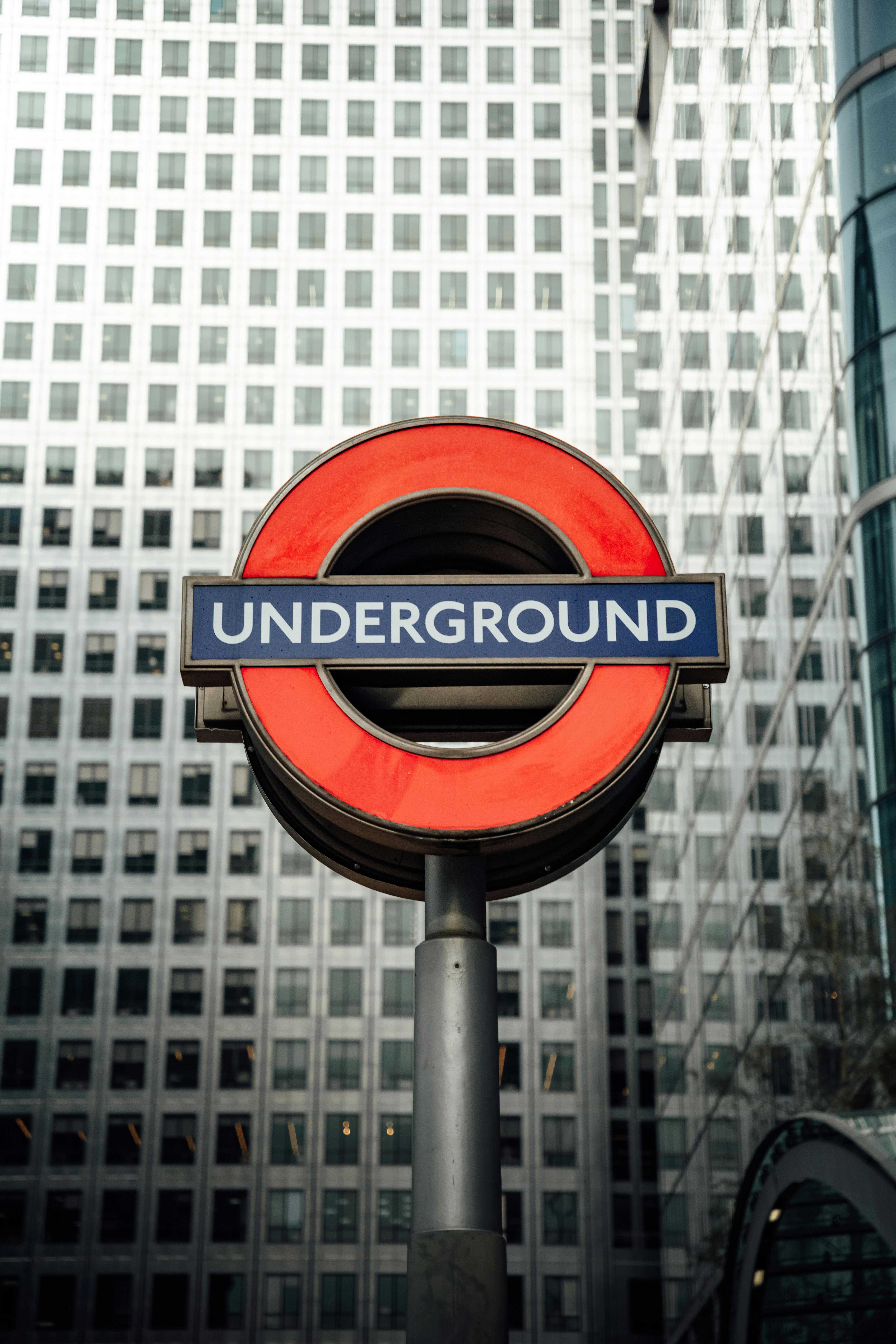 Iconic London Underground Sign at Canary Wharf · Free Stock Photo