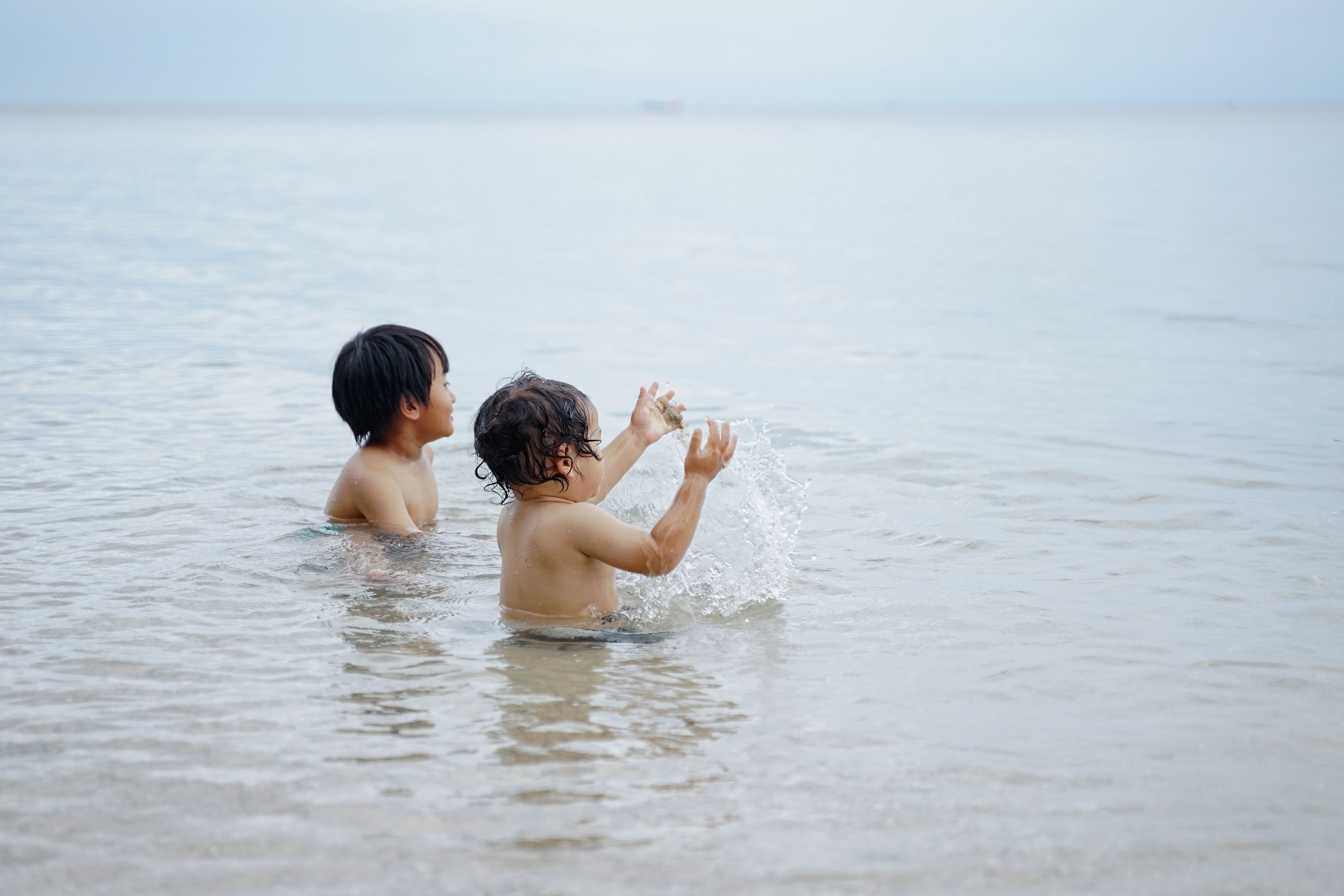 Children Playing in the Ocean at Banyuwangi · Free Stock Photo