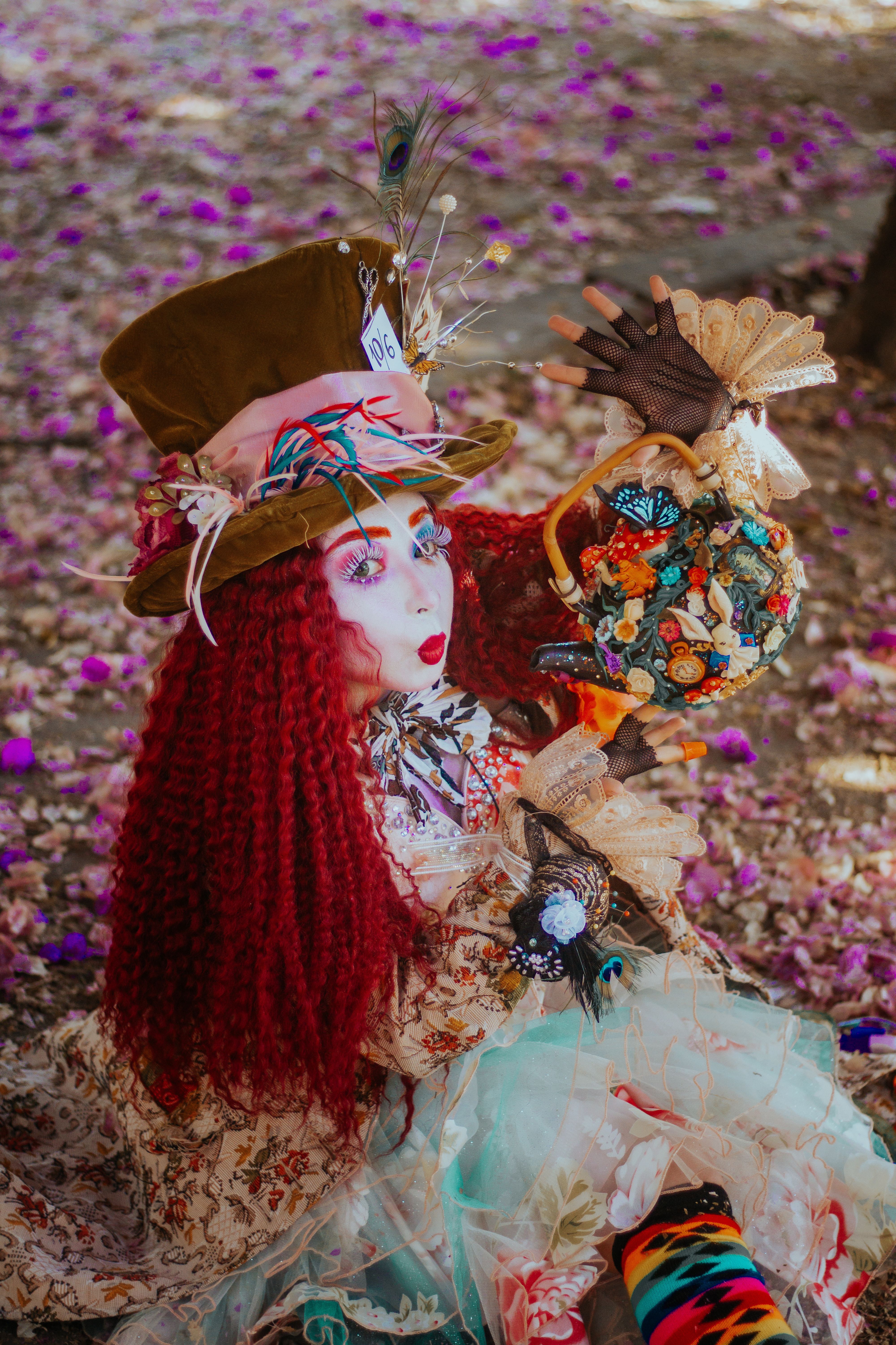 Colorful Portrait of a Mad Hatter Character Outdoors · Free Stock Photo