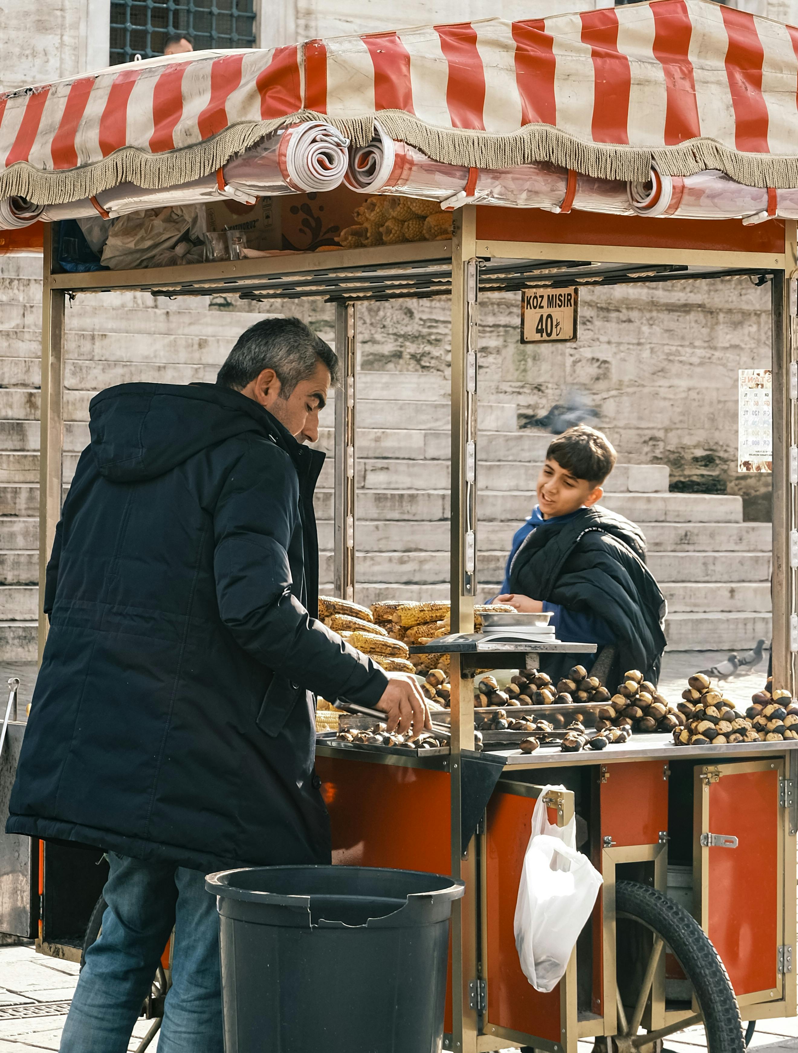 Person Pushing Food Cart On Road · Free Stock Photo
