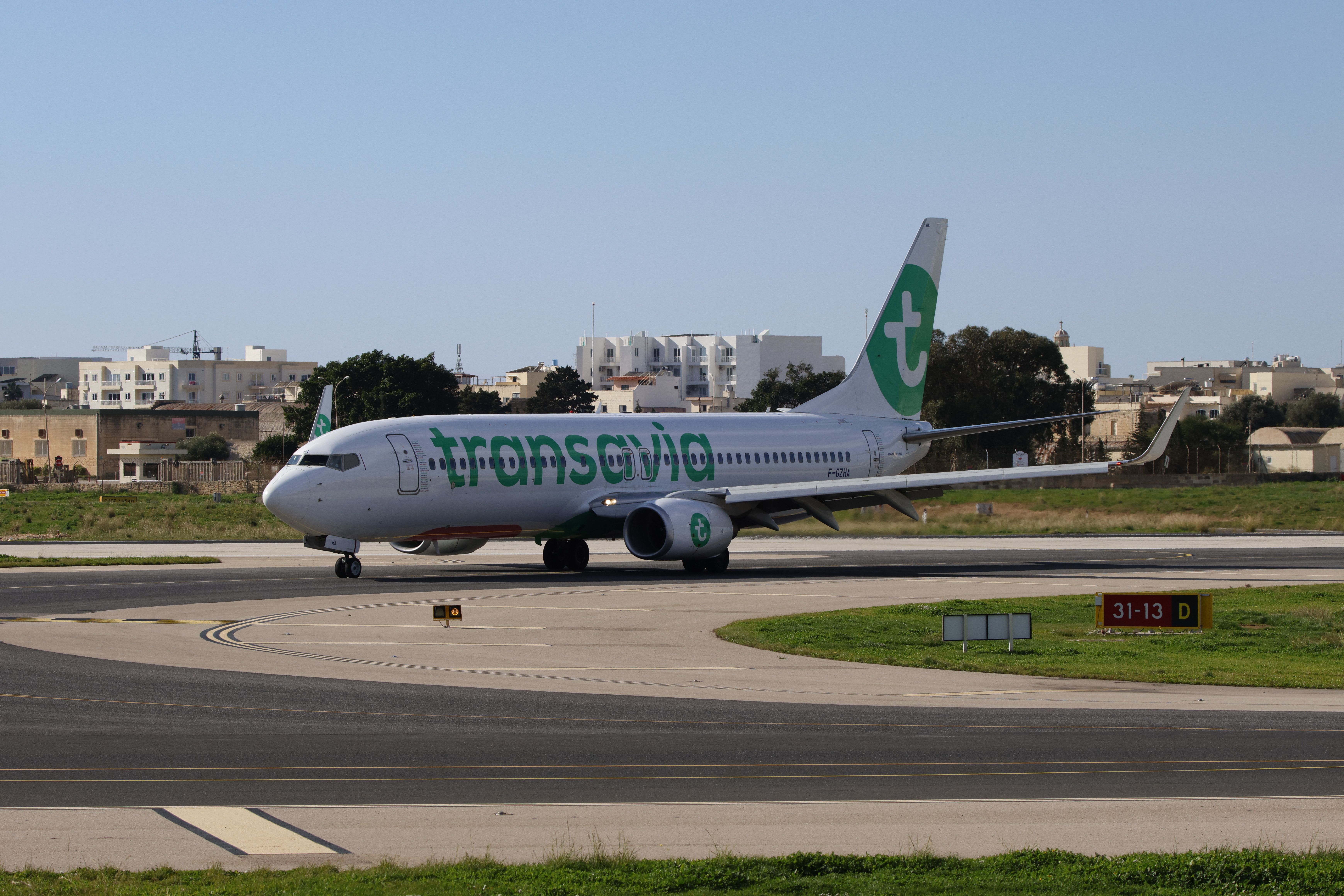 Transavia Airplane on Runway at Airport · Free Stock Photo