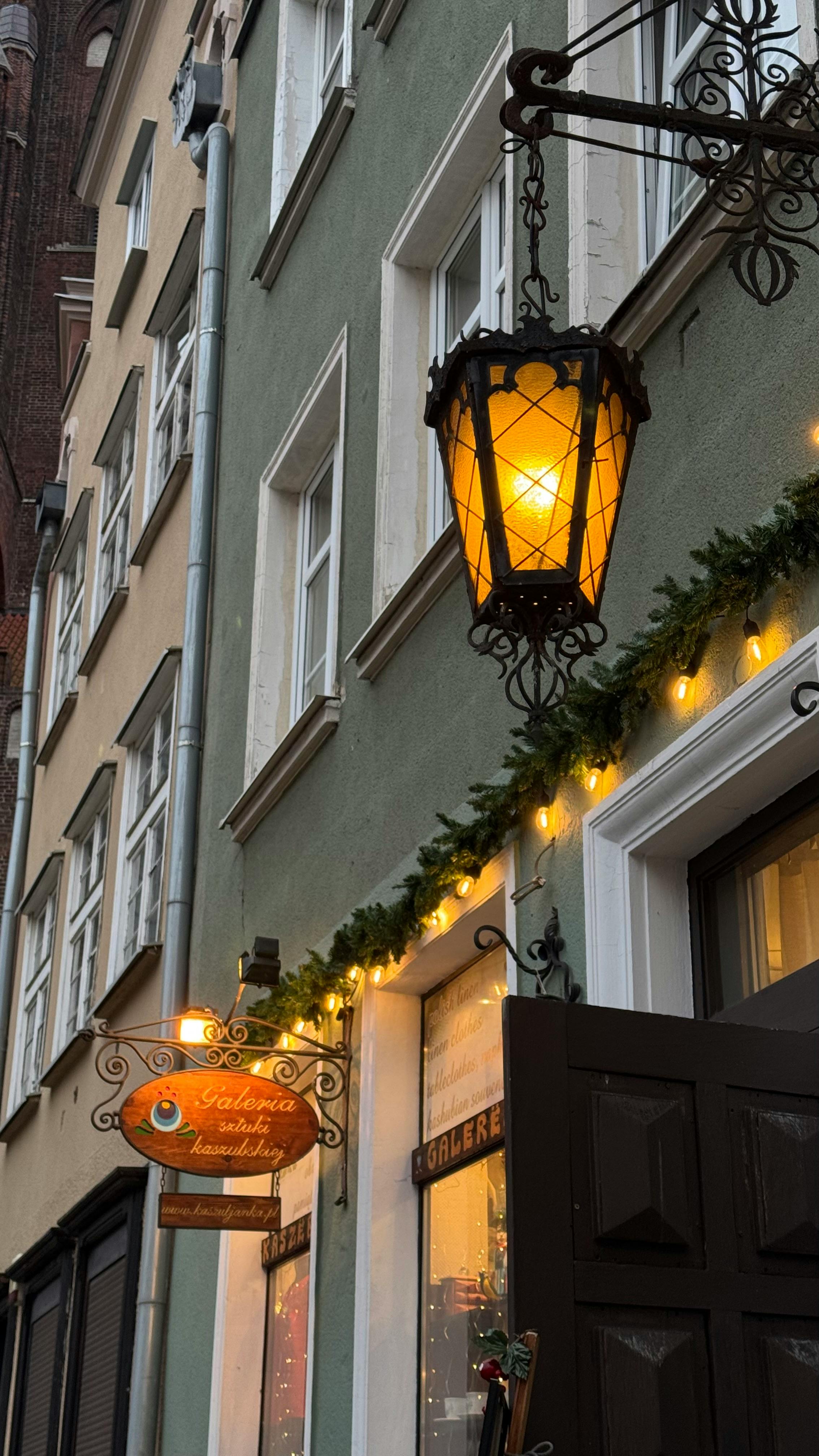 Charming European street with festive lighting · Free Stock Photo