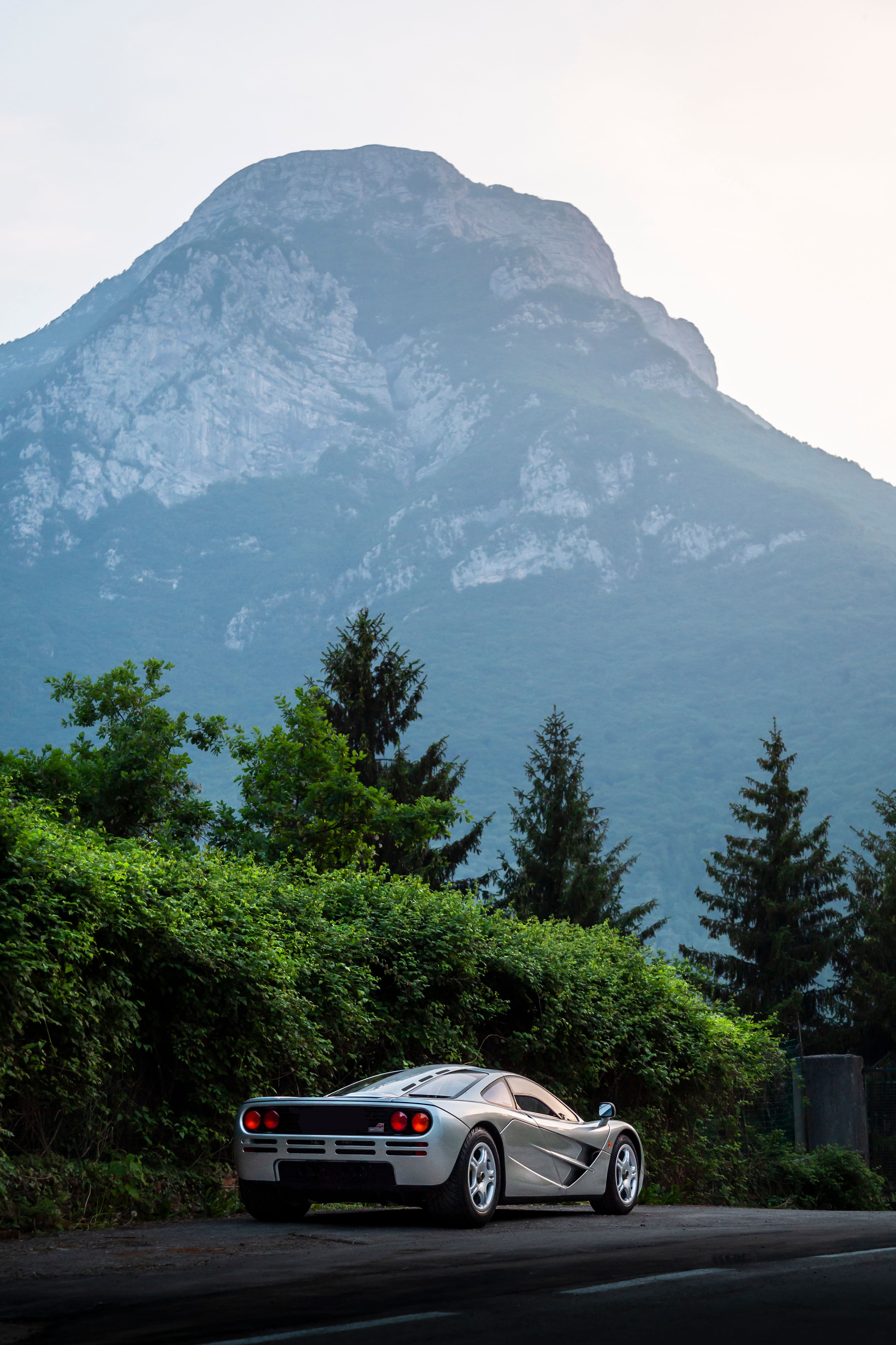 Vintage Supercar Road Trip in Scenic Alps · Free Stock Photo