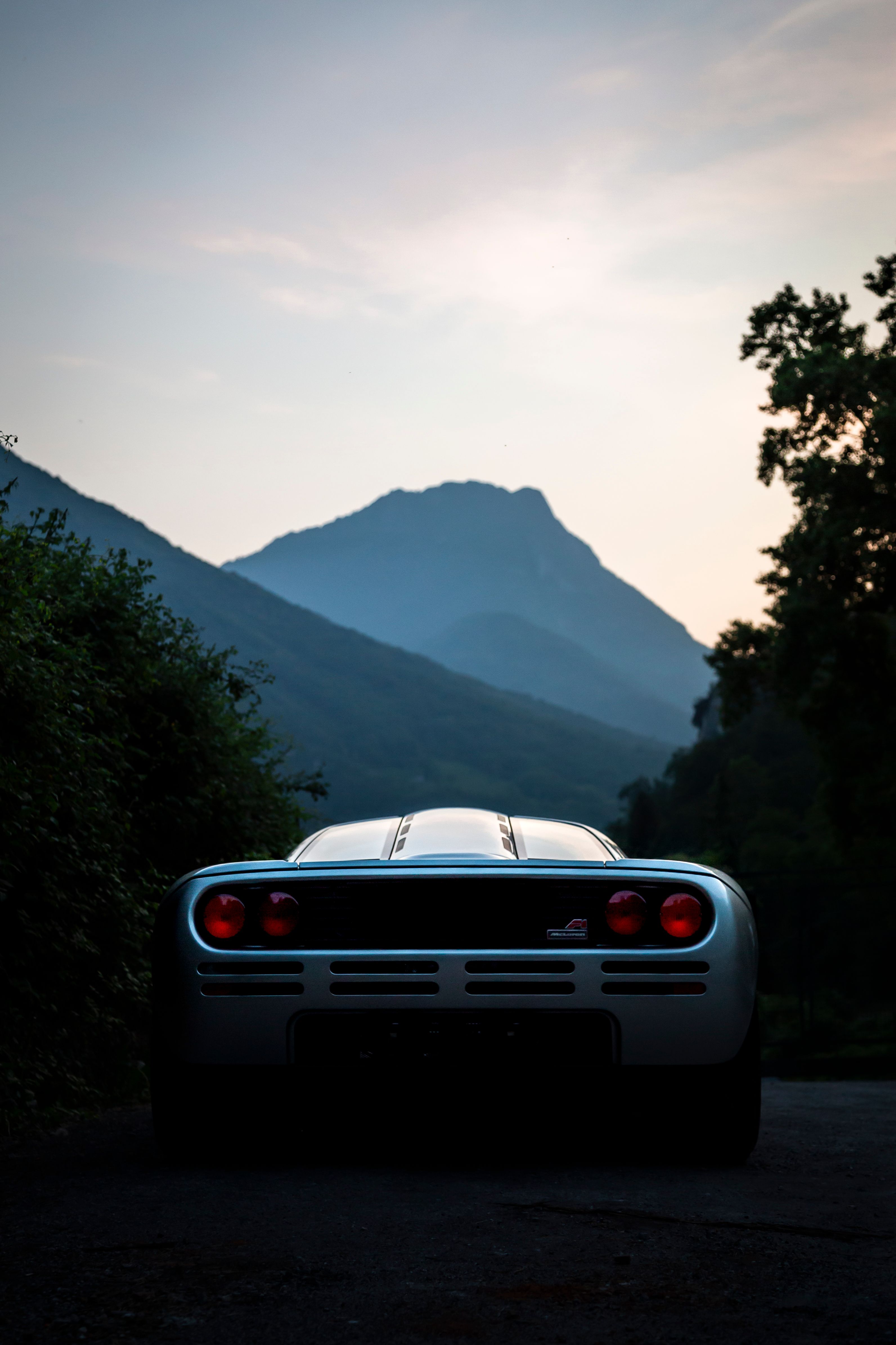 Stunning Supercar on Scenic Mountain Road · Free Stock Photo