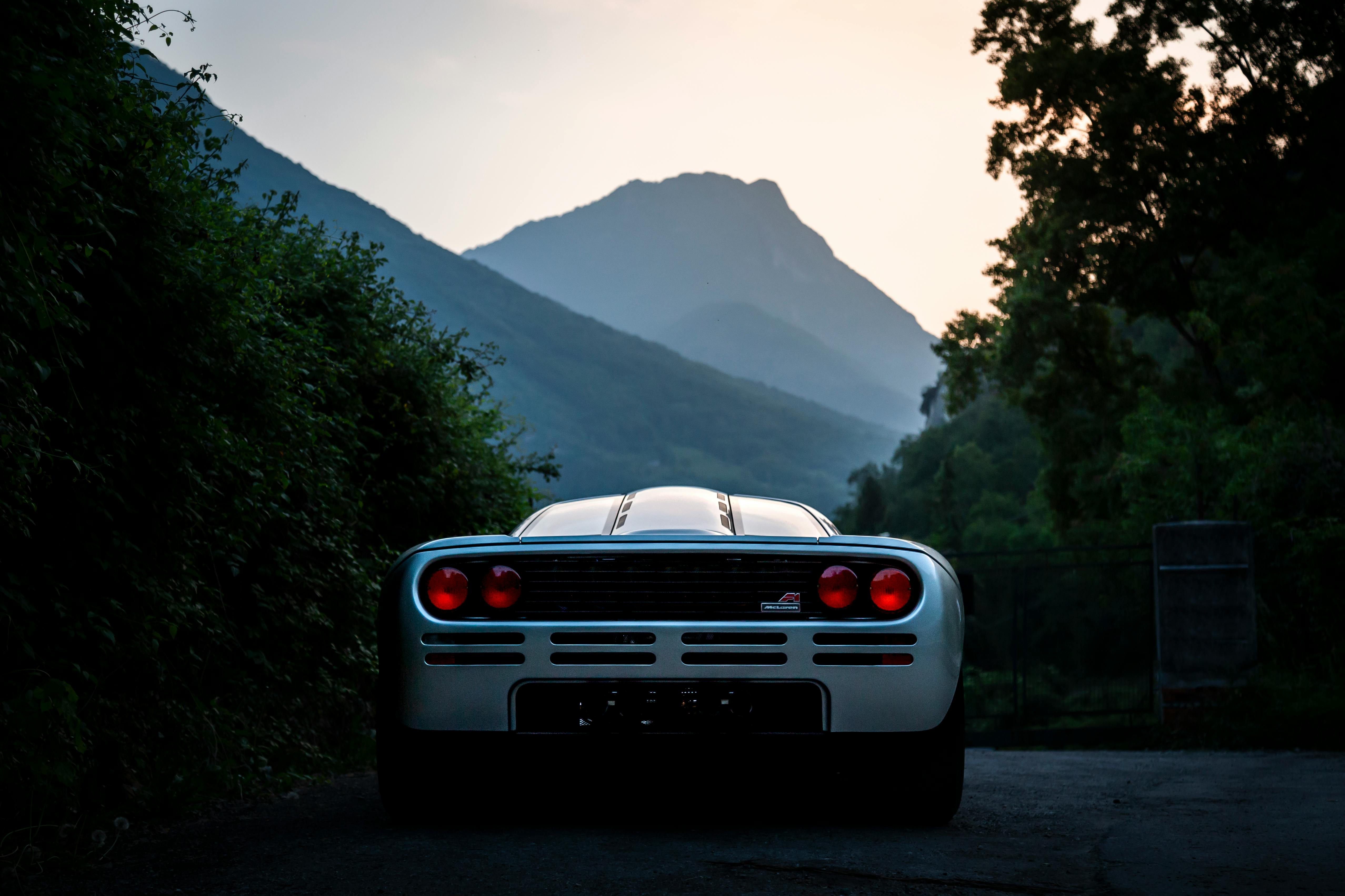 Vintage Supercar in Scenic Mountain Landscape · Free Stock Photo