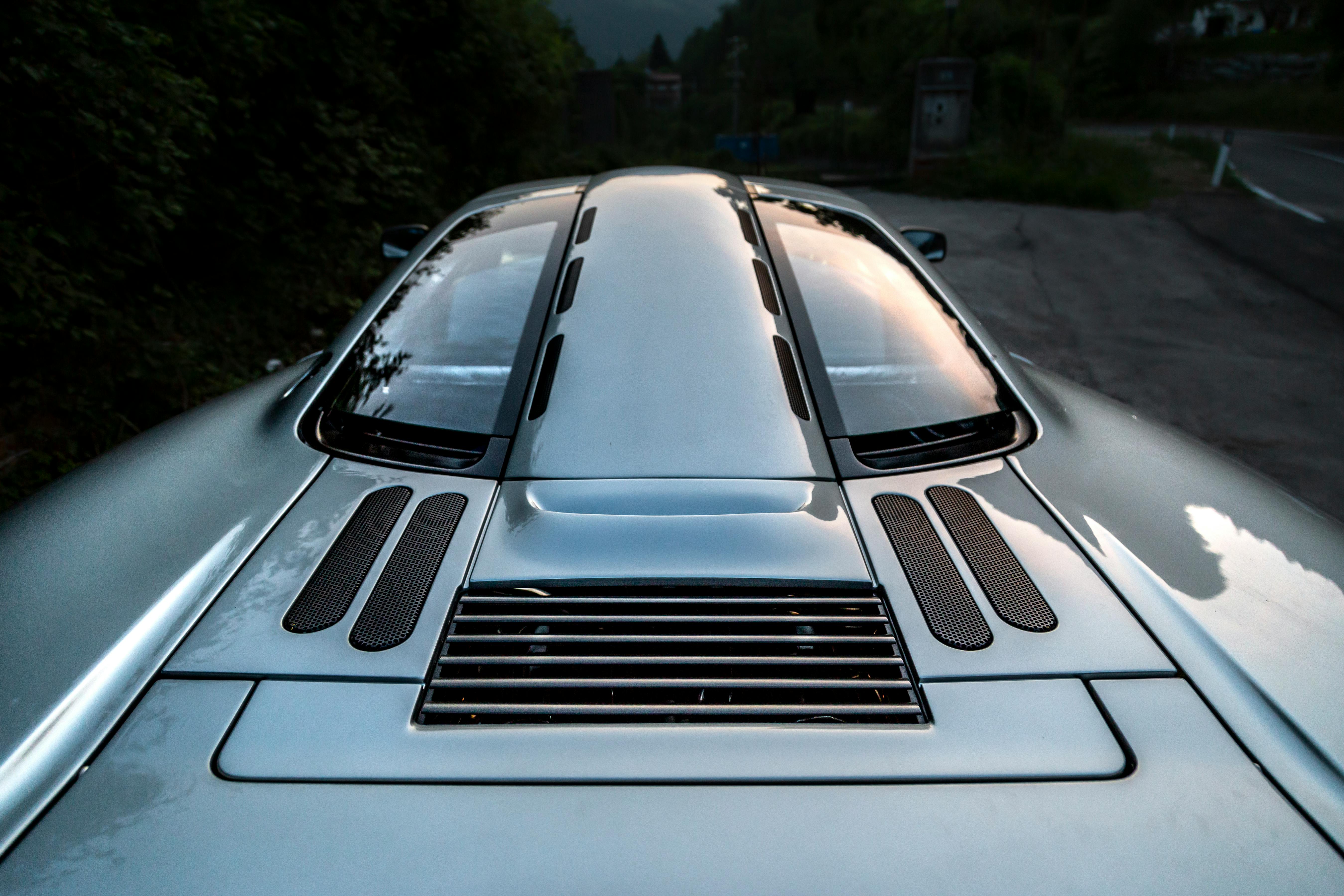 Rear View of a Classic Silver Supercar · Free Stock Photo