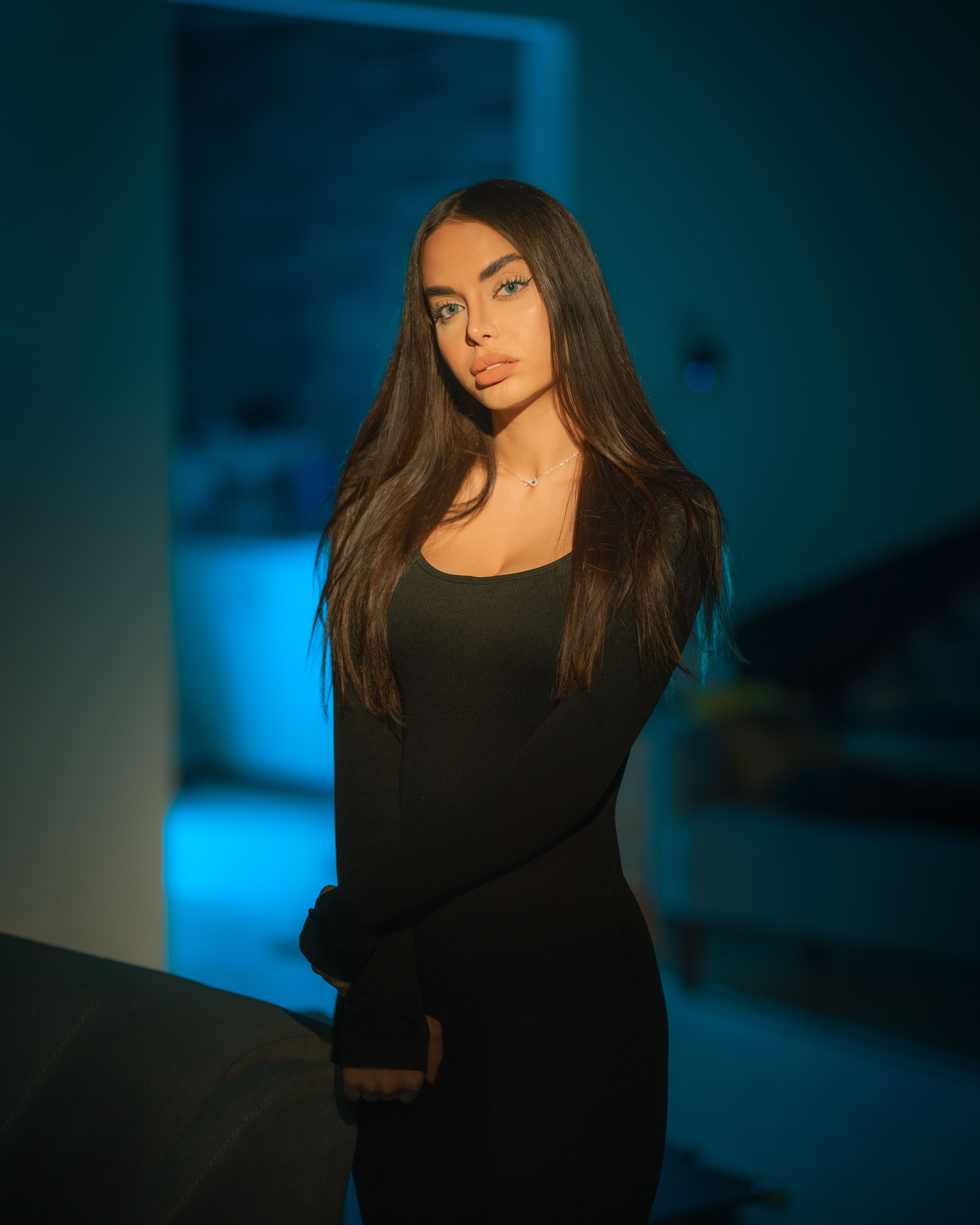 Stylish Portrait of a Woman in Ambient Lighting · Free Stock Photo