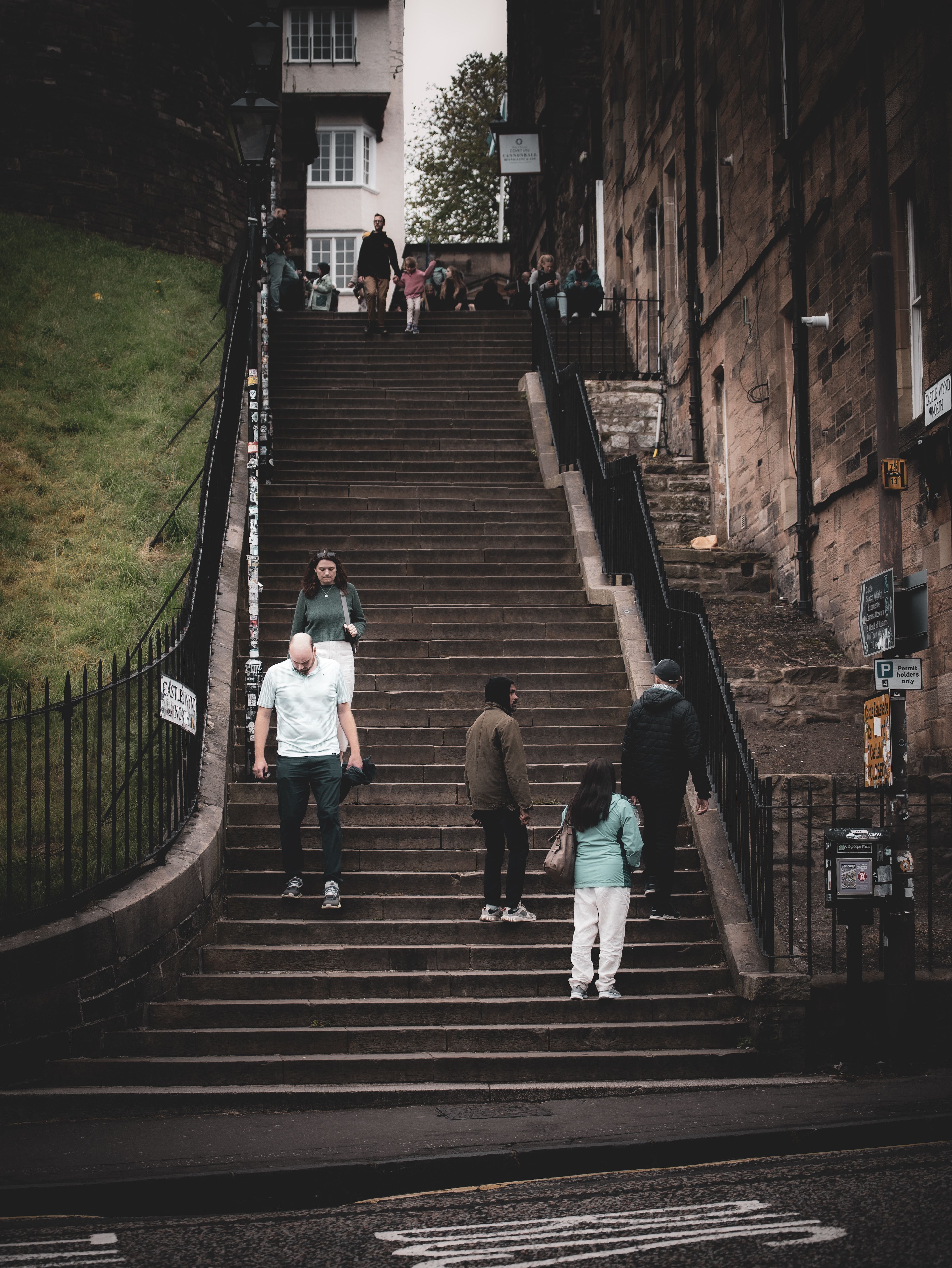 People Walking on Historic Town Staircase · Free Stock Photo