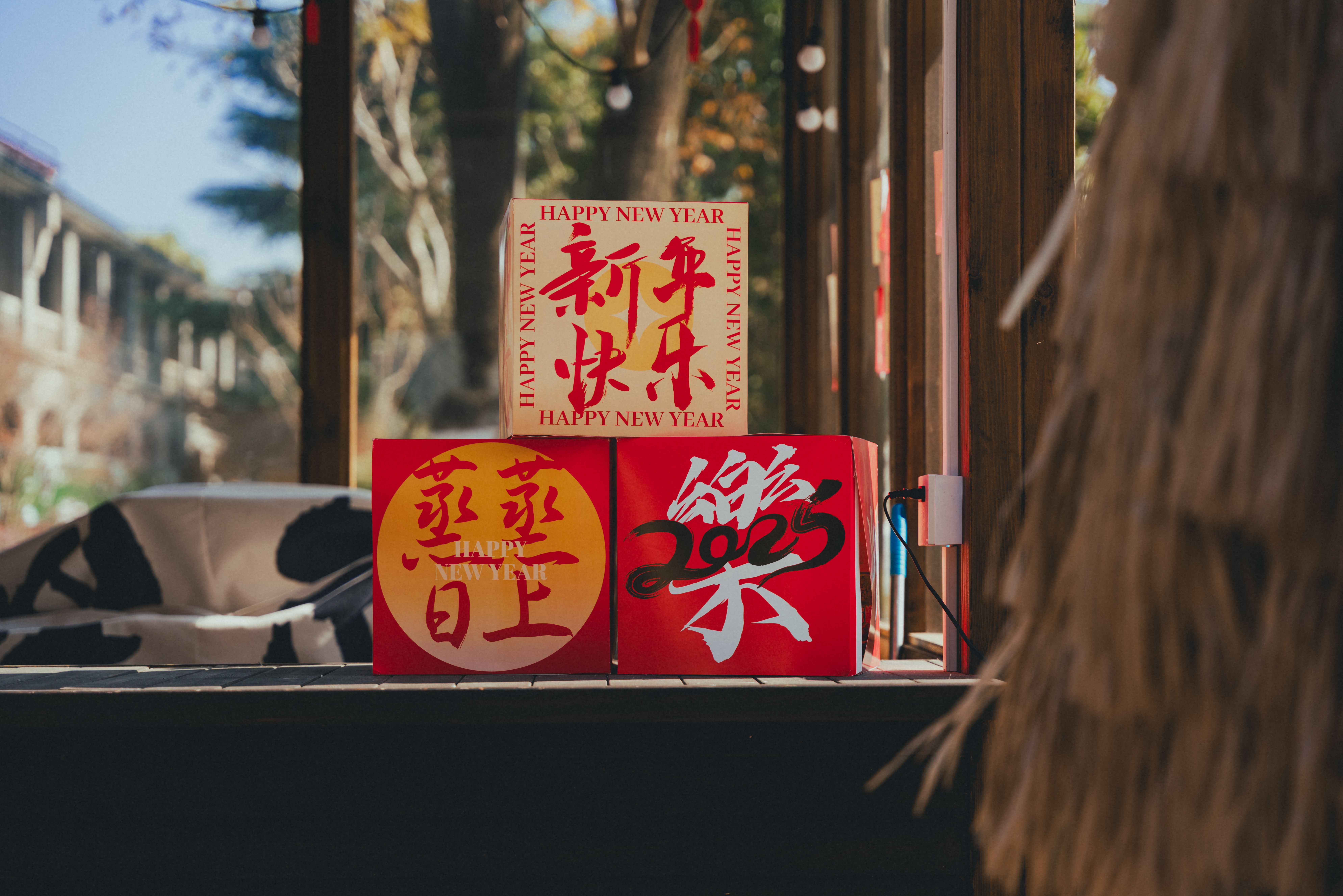 Decorative Chinese New Year Boxes in Cozy Setting · Free Stock Photo