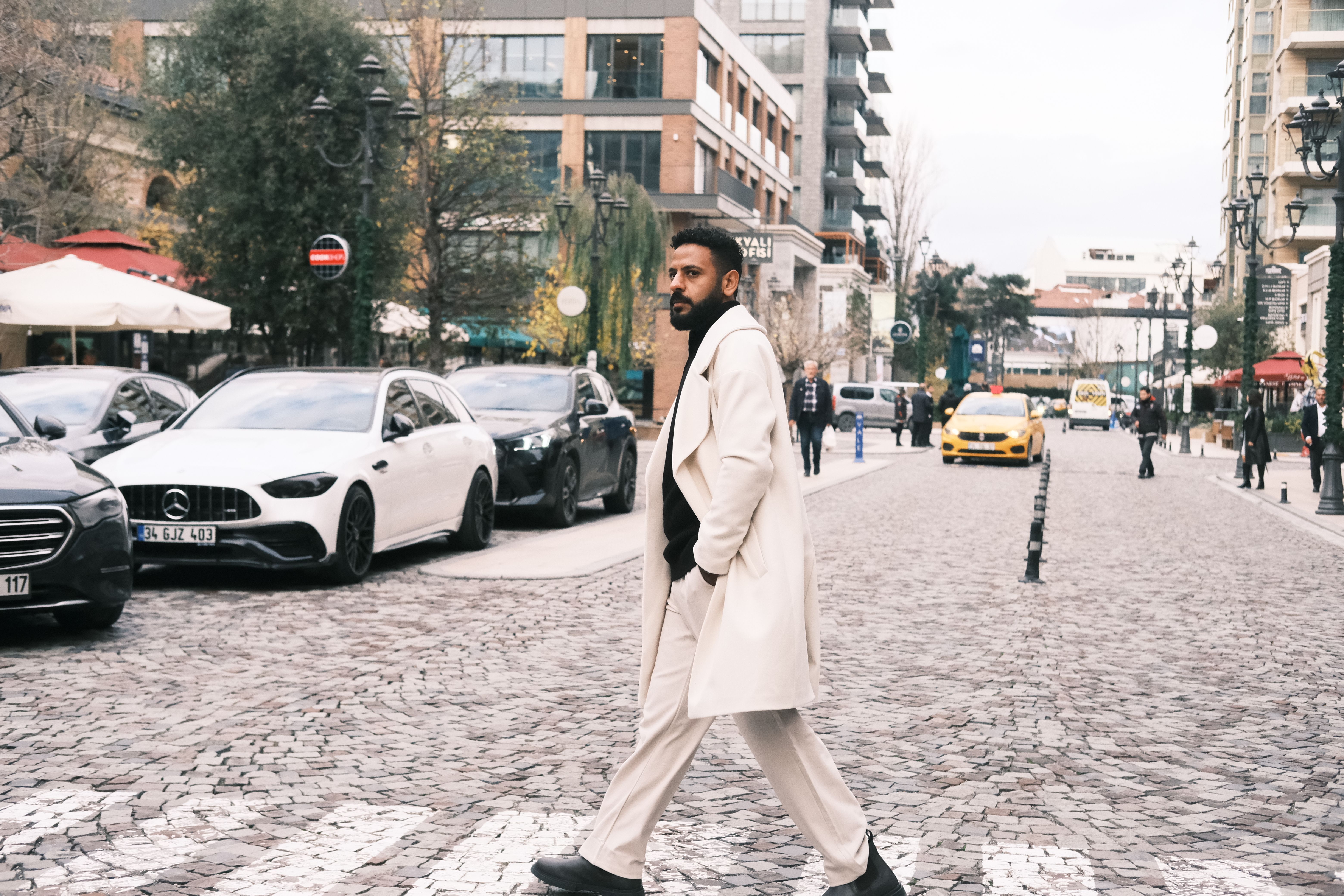 Fashionable Man Crossing Street in İstanbul · Free Stock Photo