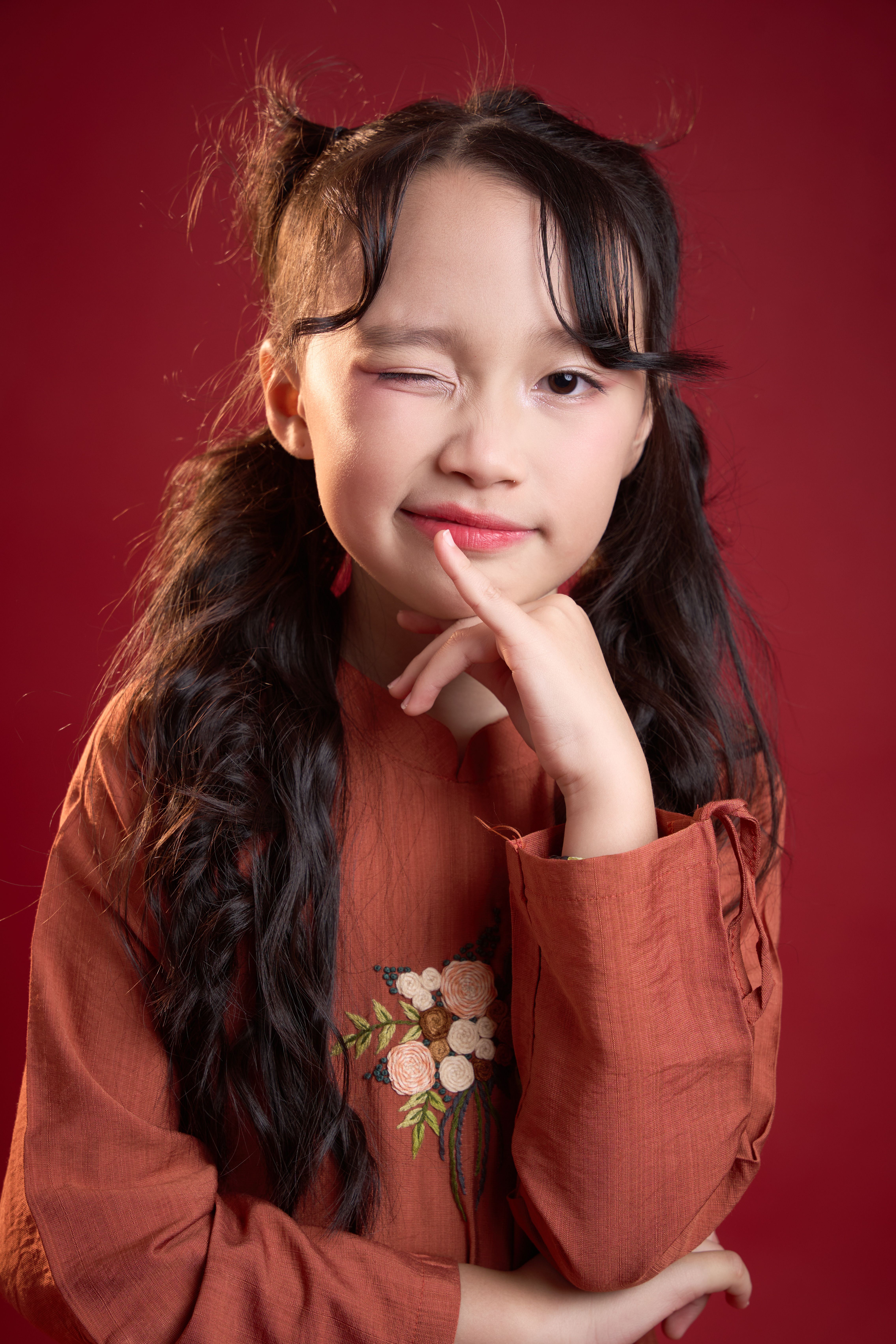 Charming Portrait of a Cute Vietnamese Girl Winking · Free Stock Photo