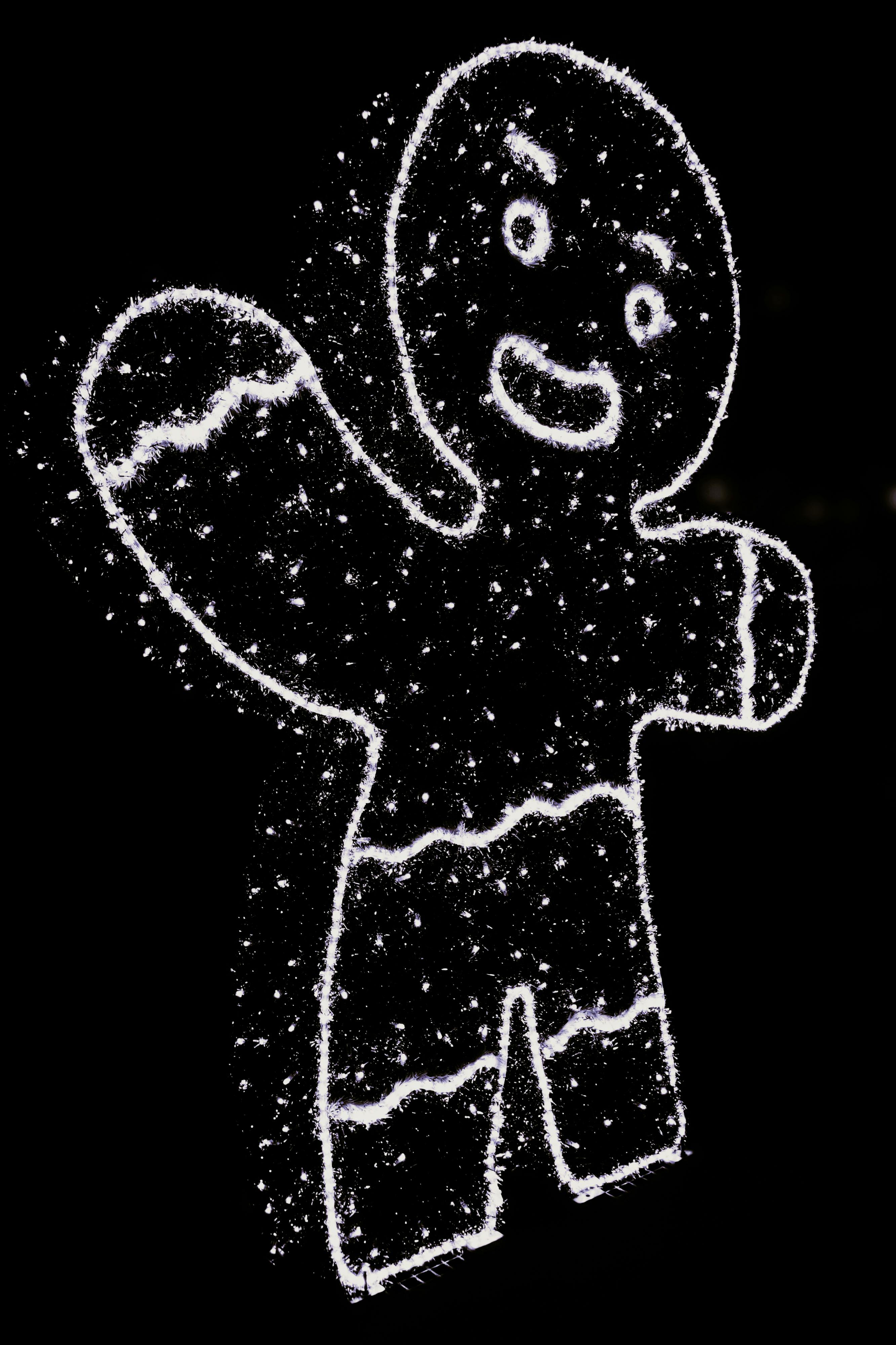 Chalk Gingerbread Man on Dark Background · Free Stock Photo