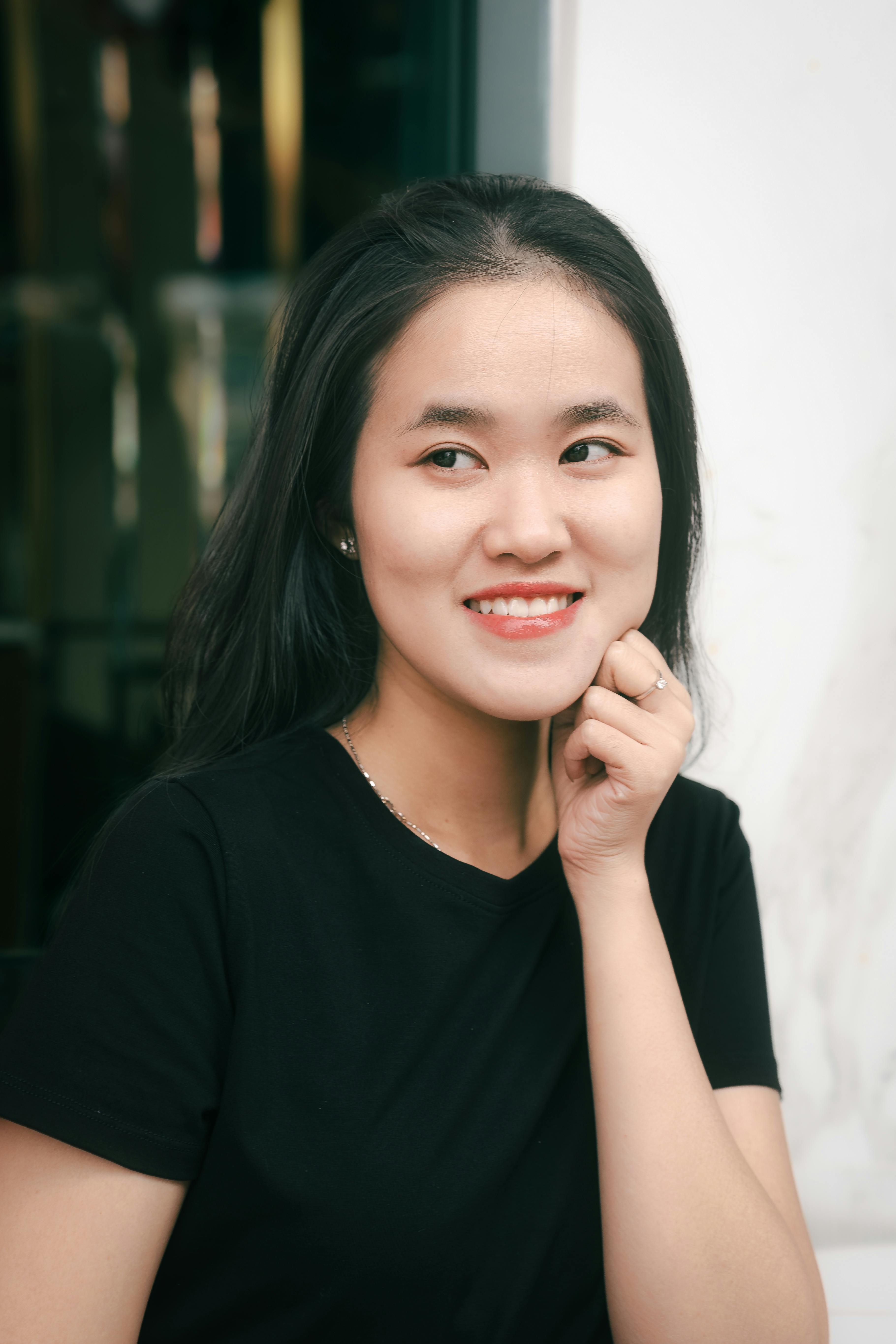 Smiling Woman in Black Shirt Portrait · Free Stock Photo