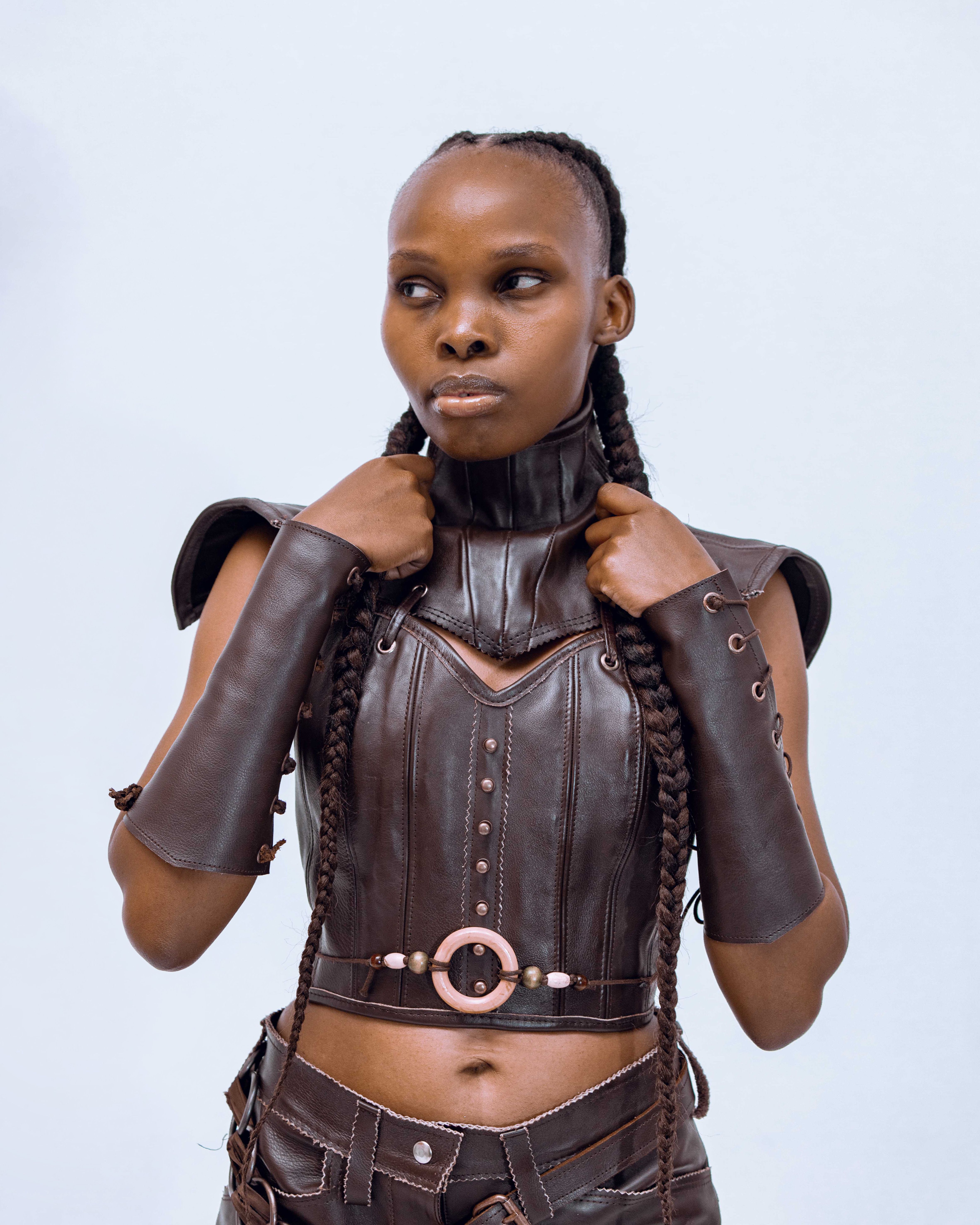 Bold Warrior Woman in Leather Armor · Free Stock Photo