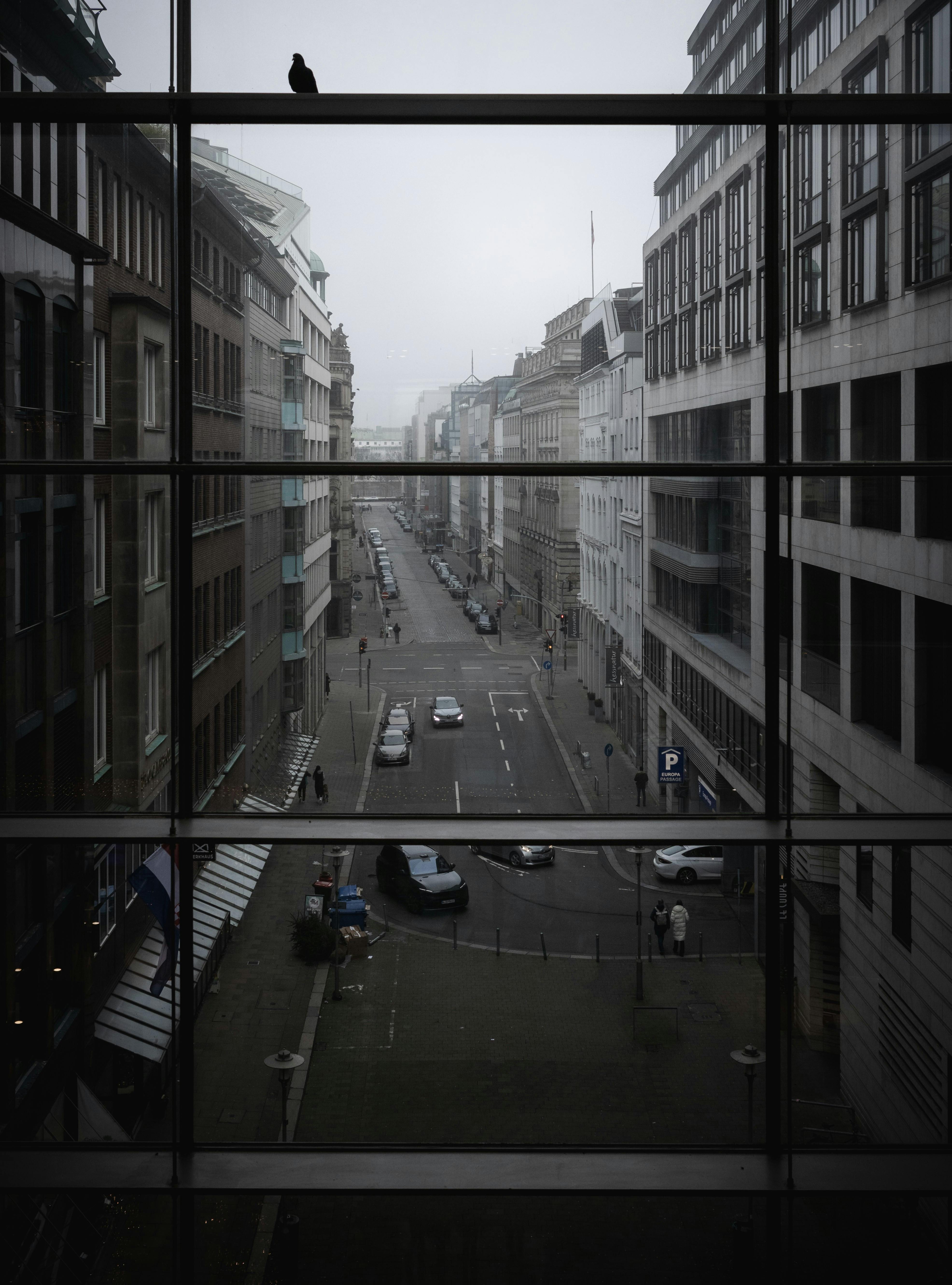 Urban Street View Through Glass in Hamburg · Free Stock Photo