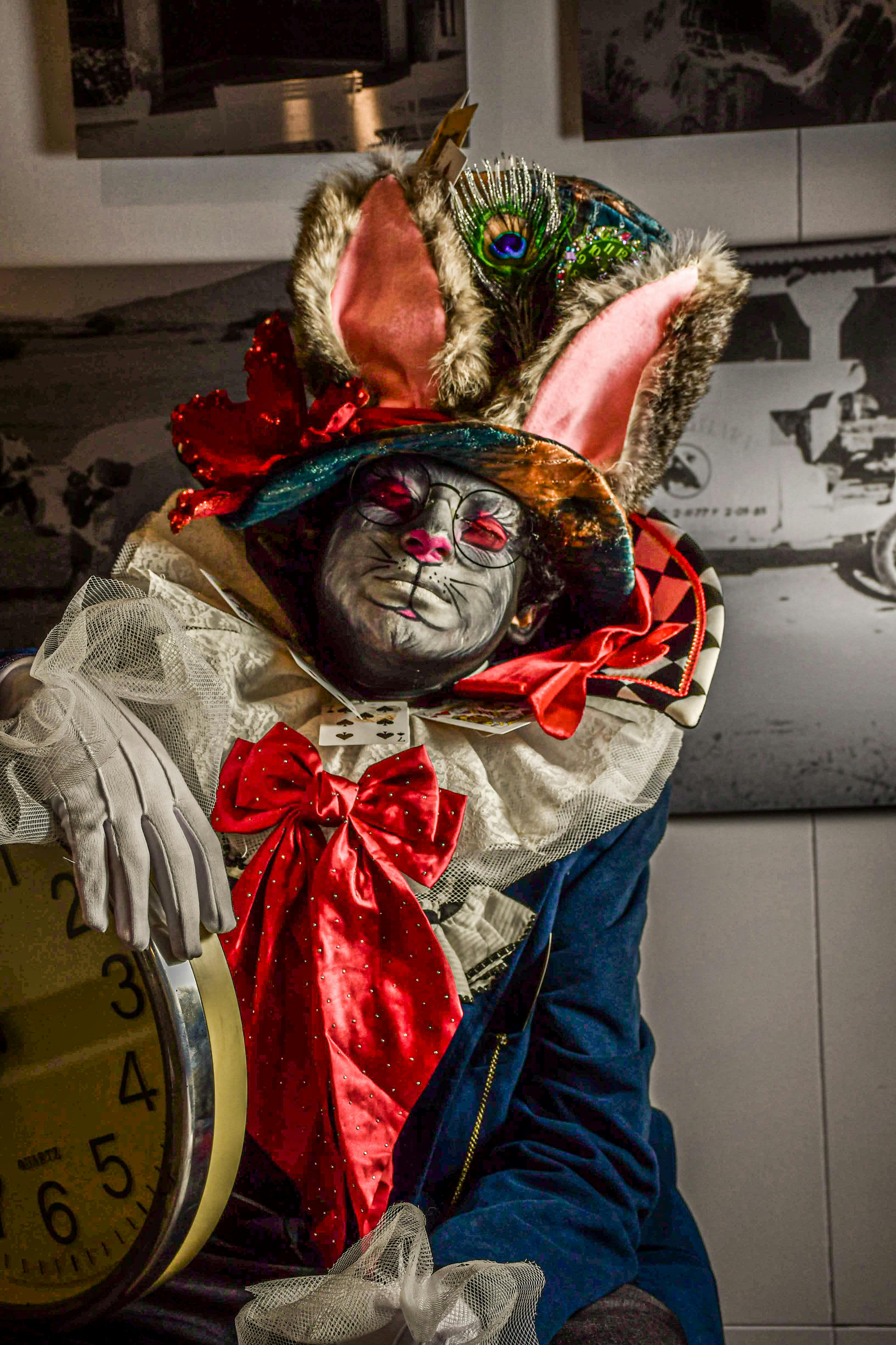 Colorful White Rabbit Cosplay with Clock Accessory · Free Stock Photo