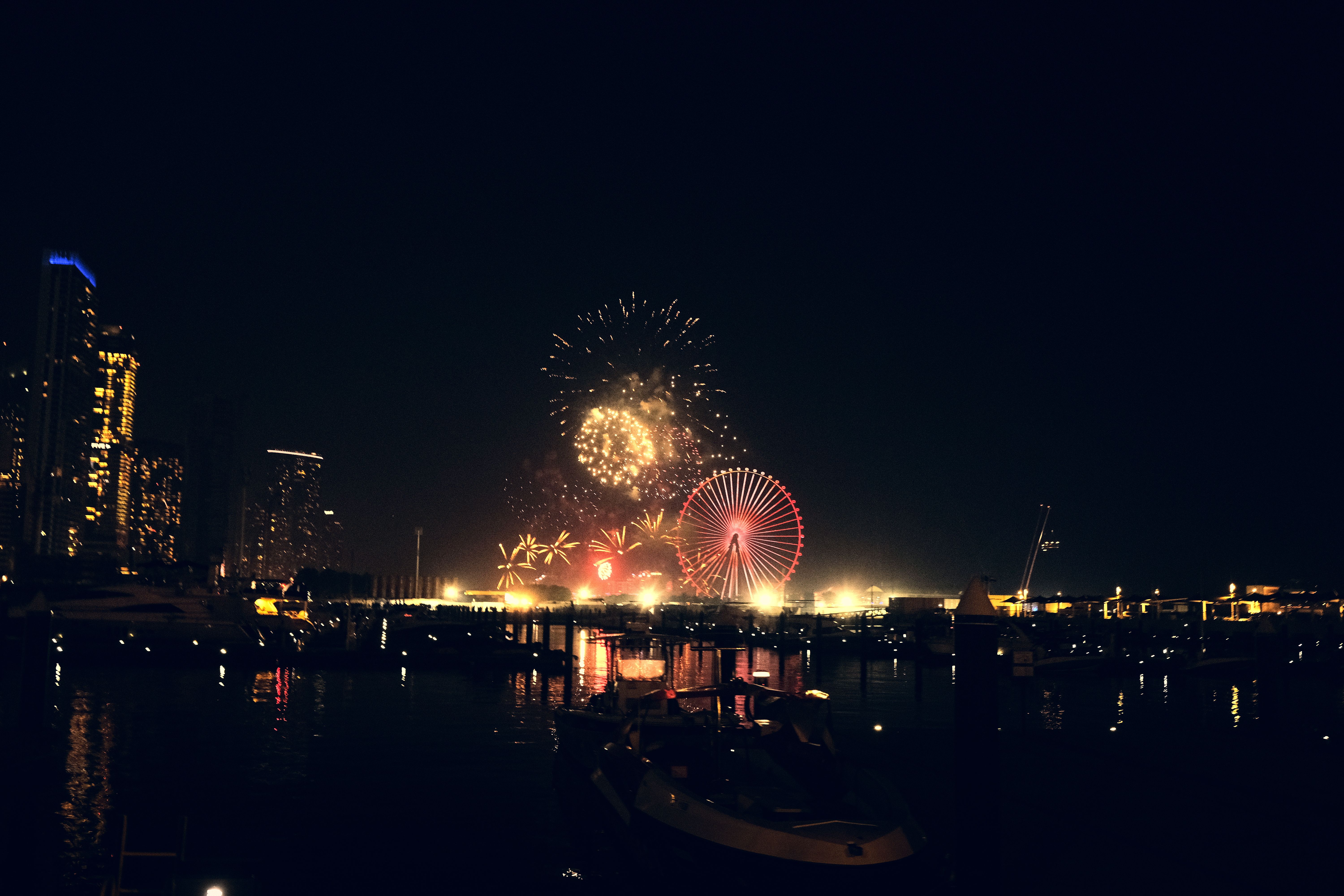 Spectacular Fireworks Over City Waterfront · Free Stock Photo