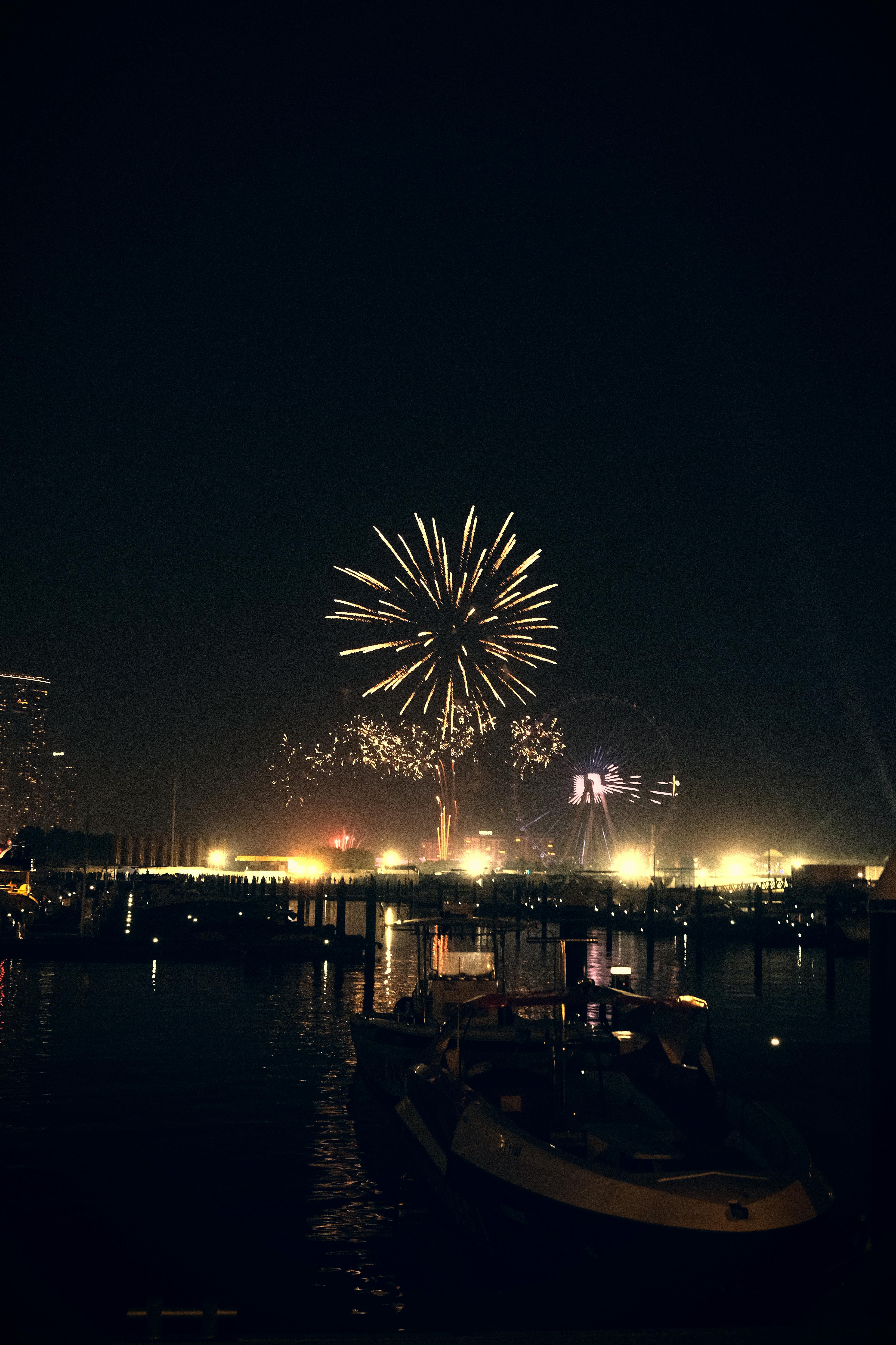 Vibrant Waterfront Fireworks Display Celebration · Free Stock Photo